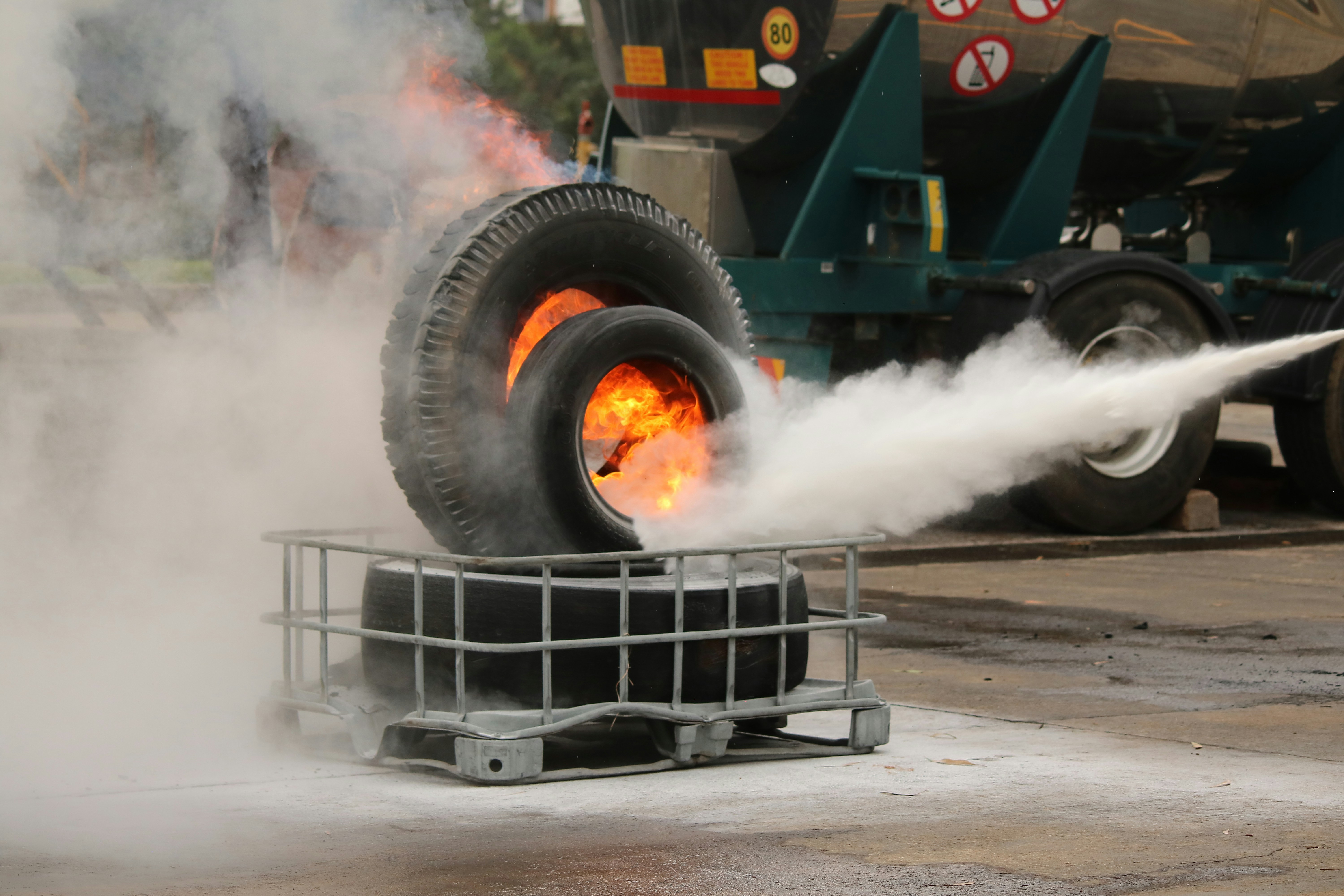 Burning tires are being extinguished with foam. photo – Free Fire Image ...