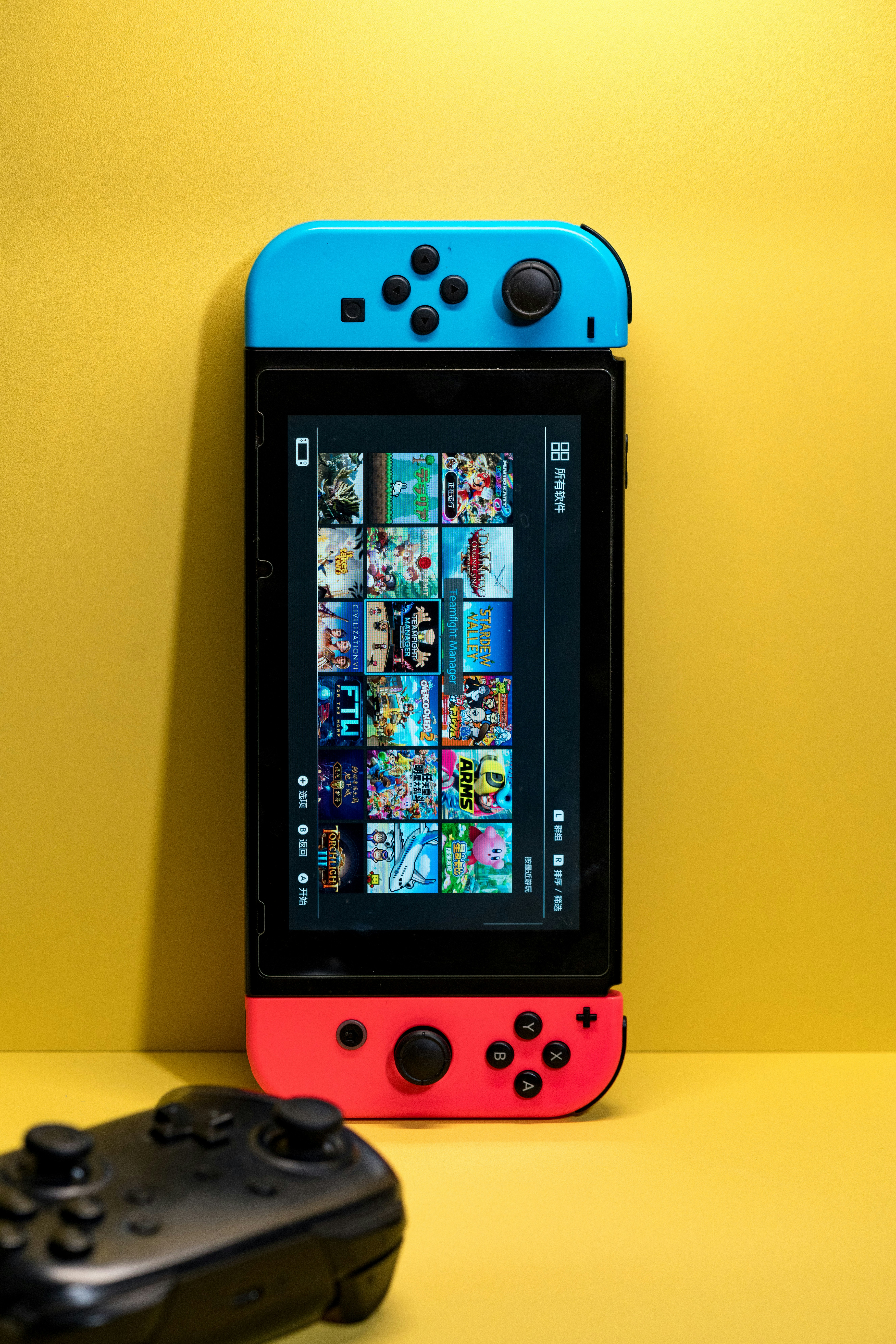 A nintendo switch with games displayed on its screen. photo – Free ...