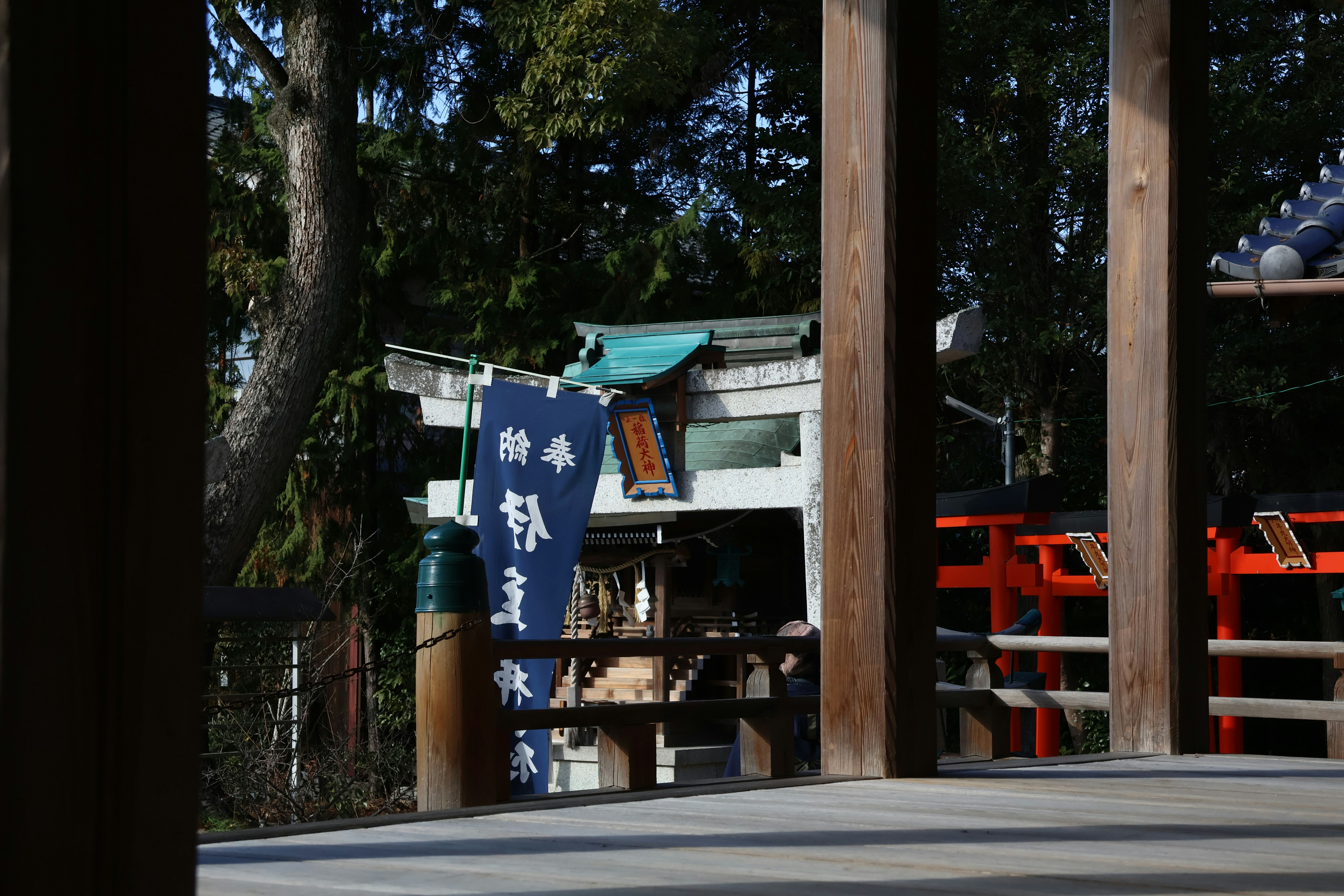 A view through wooden posts to a shrine. photo – Free Japan Image on ...