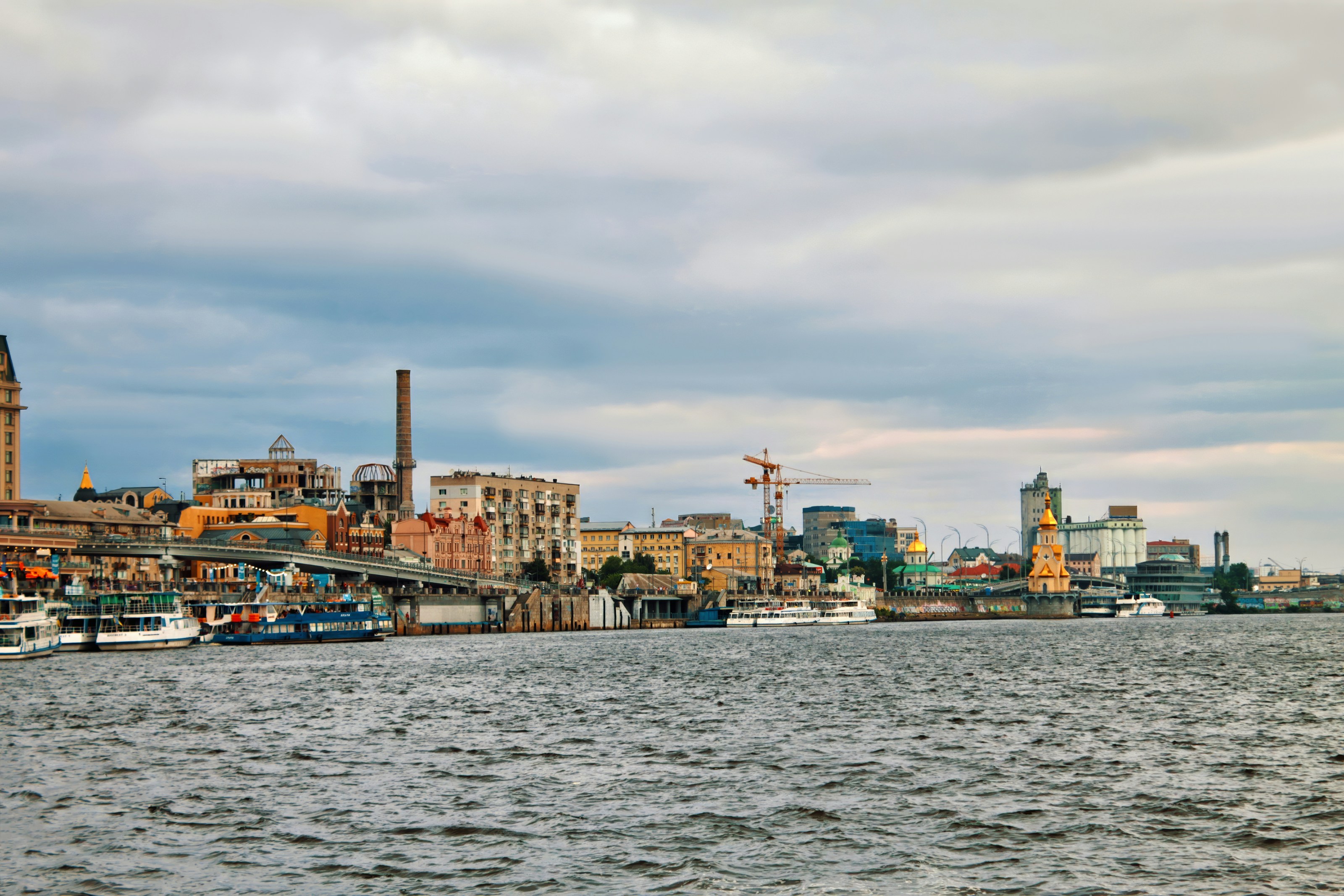 Riverside Harmony: Urban Life and Industry