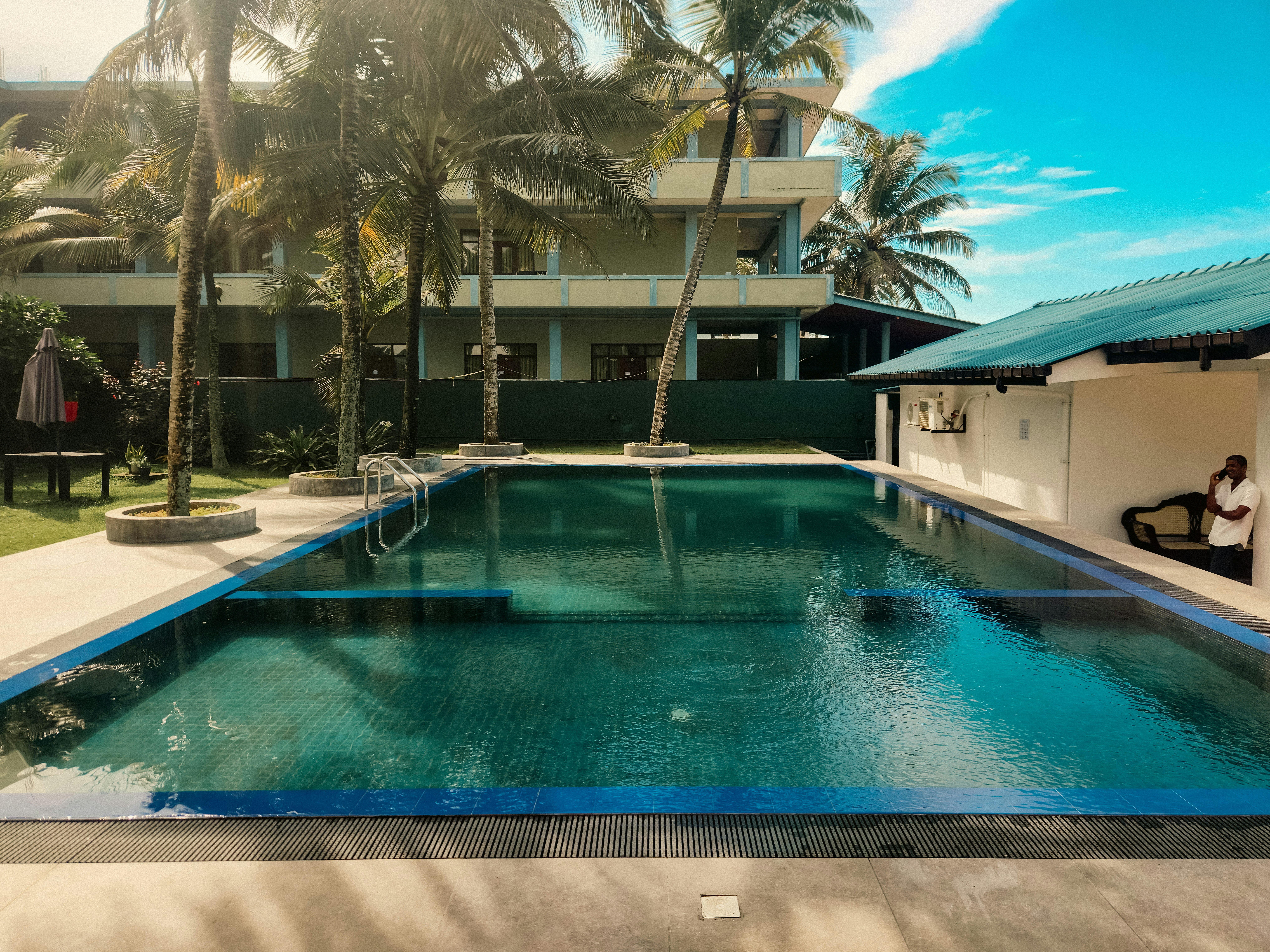 A beautiful swimming pool in a tropical setting. photo – Free Travel ...