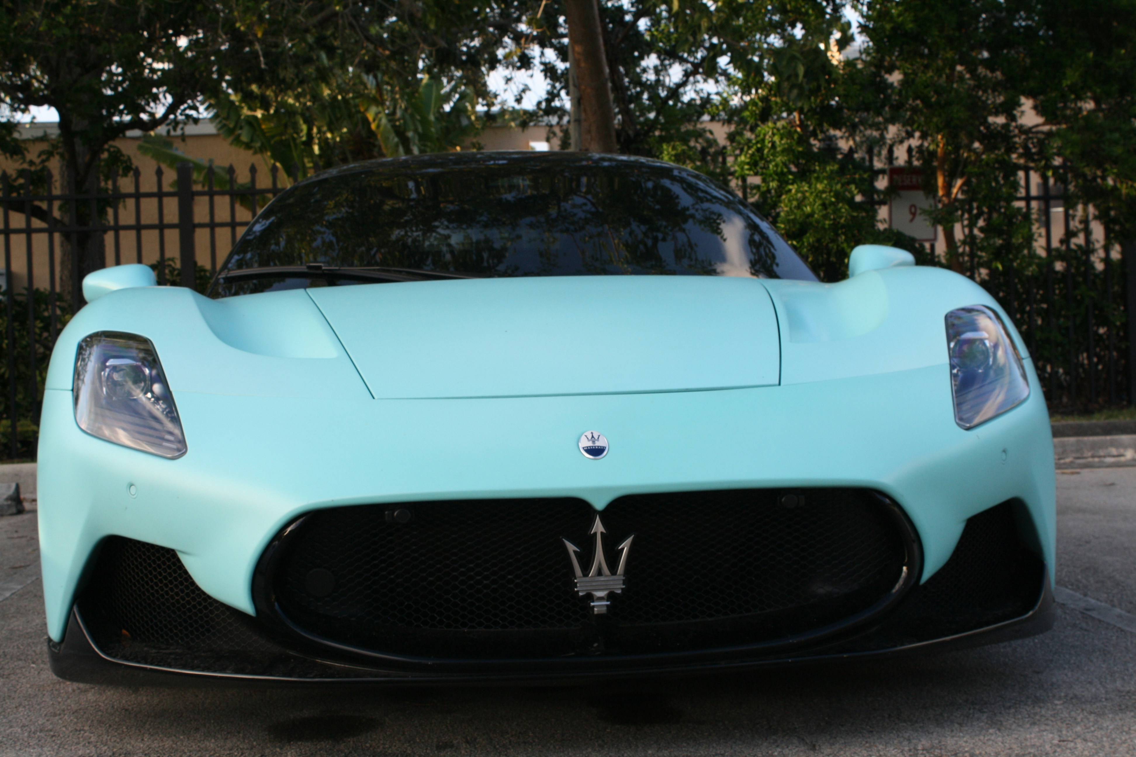 Mint Turquoise Maserati: Front-Facing Dominance in a Quiet Parking Lot