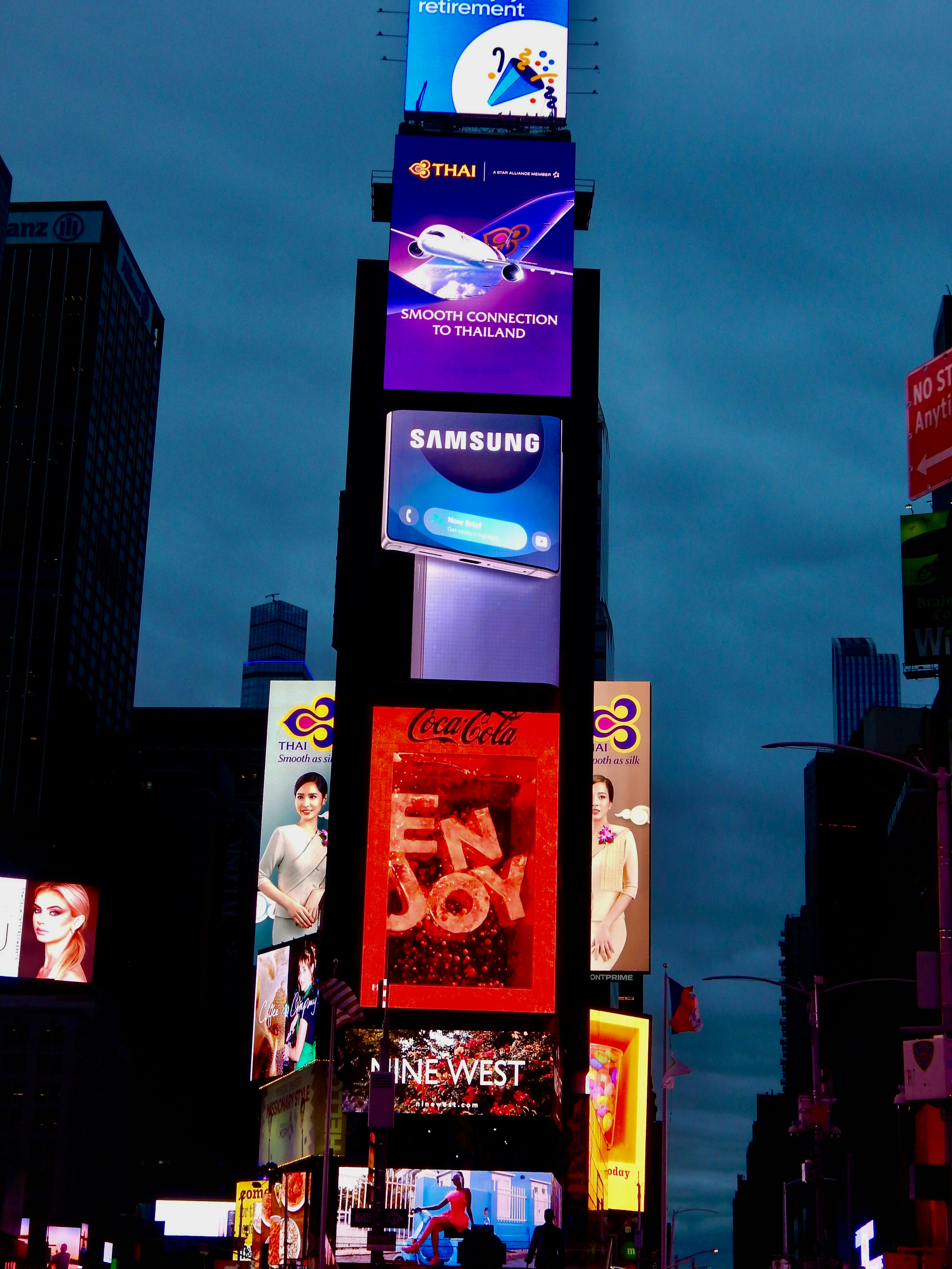 Towering Neon Pulse: Billboard Cathedral in Blue Hour