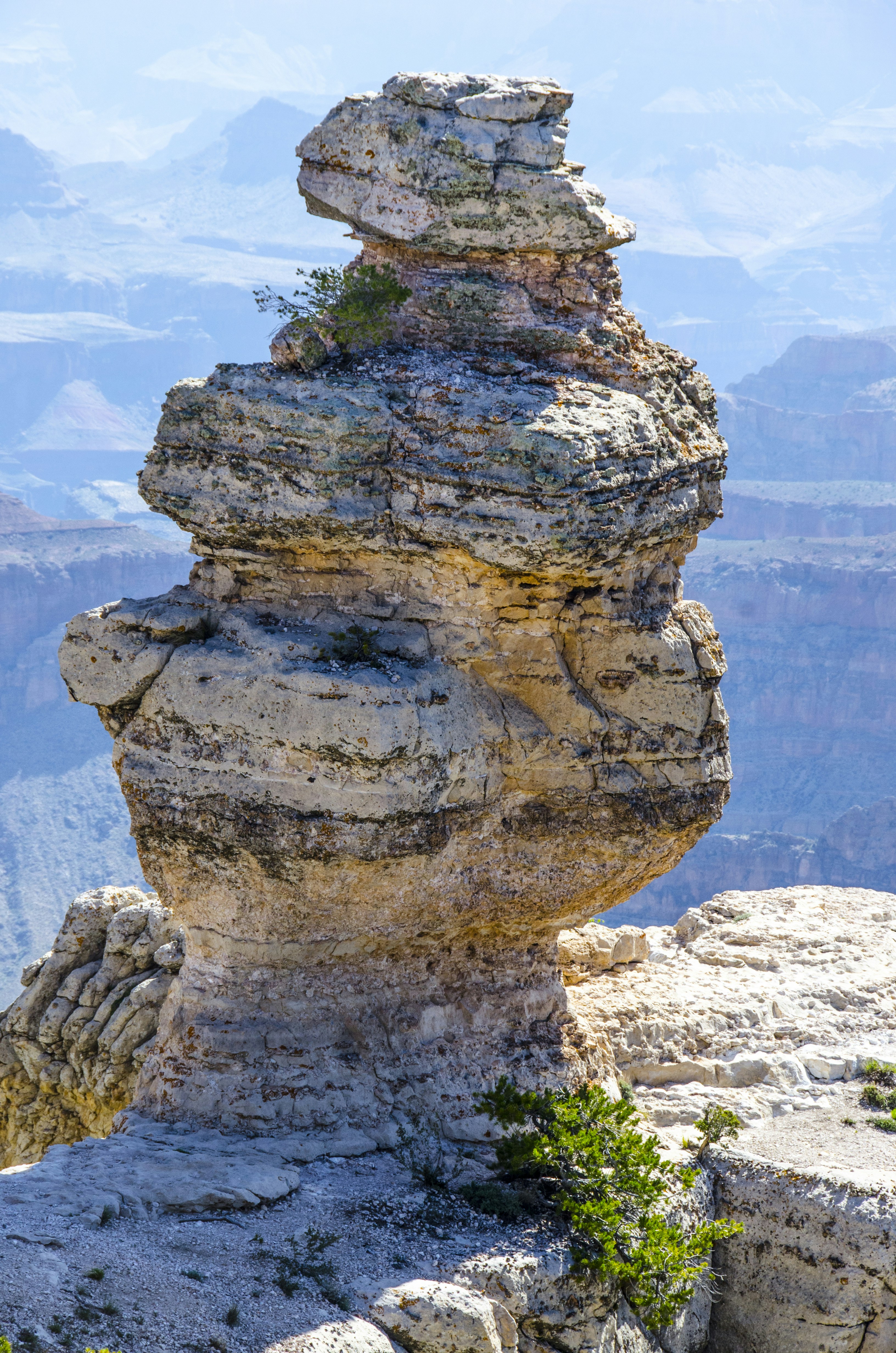 Sentinel of Stone: A Lone Rock Stack at the Canyon Rim