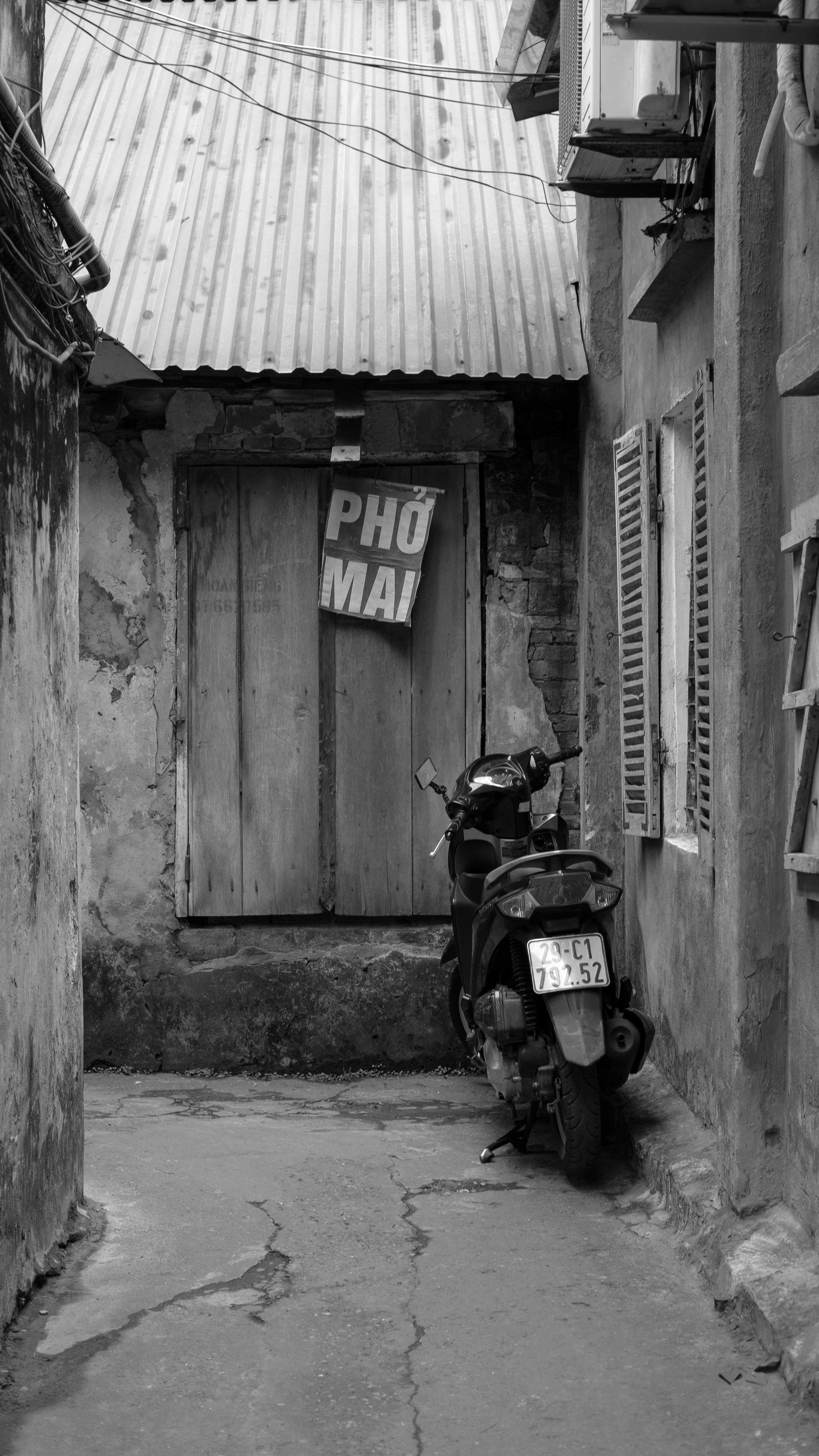 Scooter at the End of a Weathered Alley