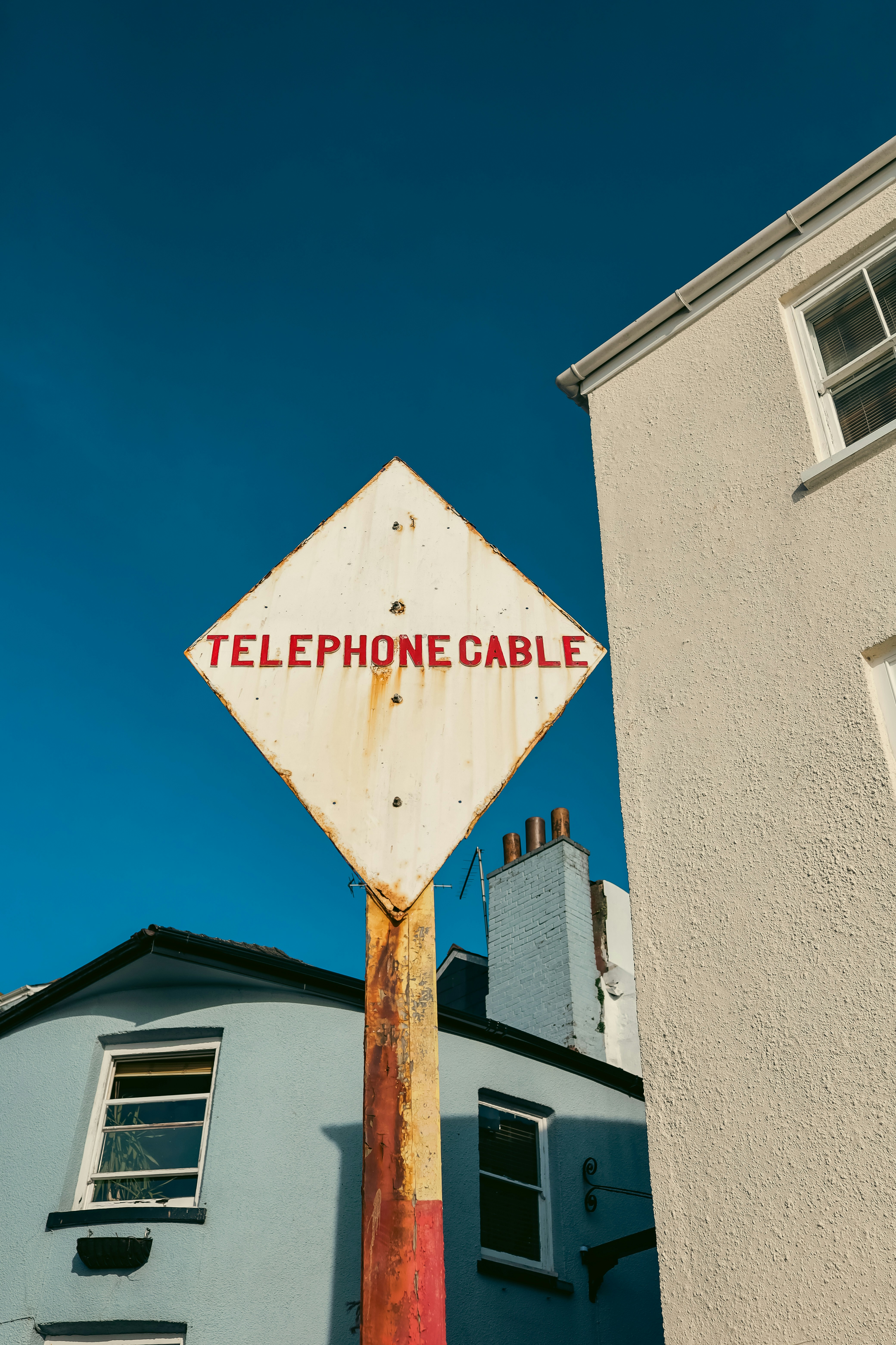 Sign warns of an underground telephone cable. photo – Free Symbol Image ...