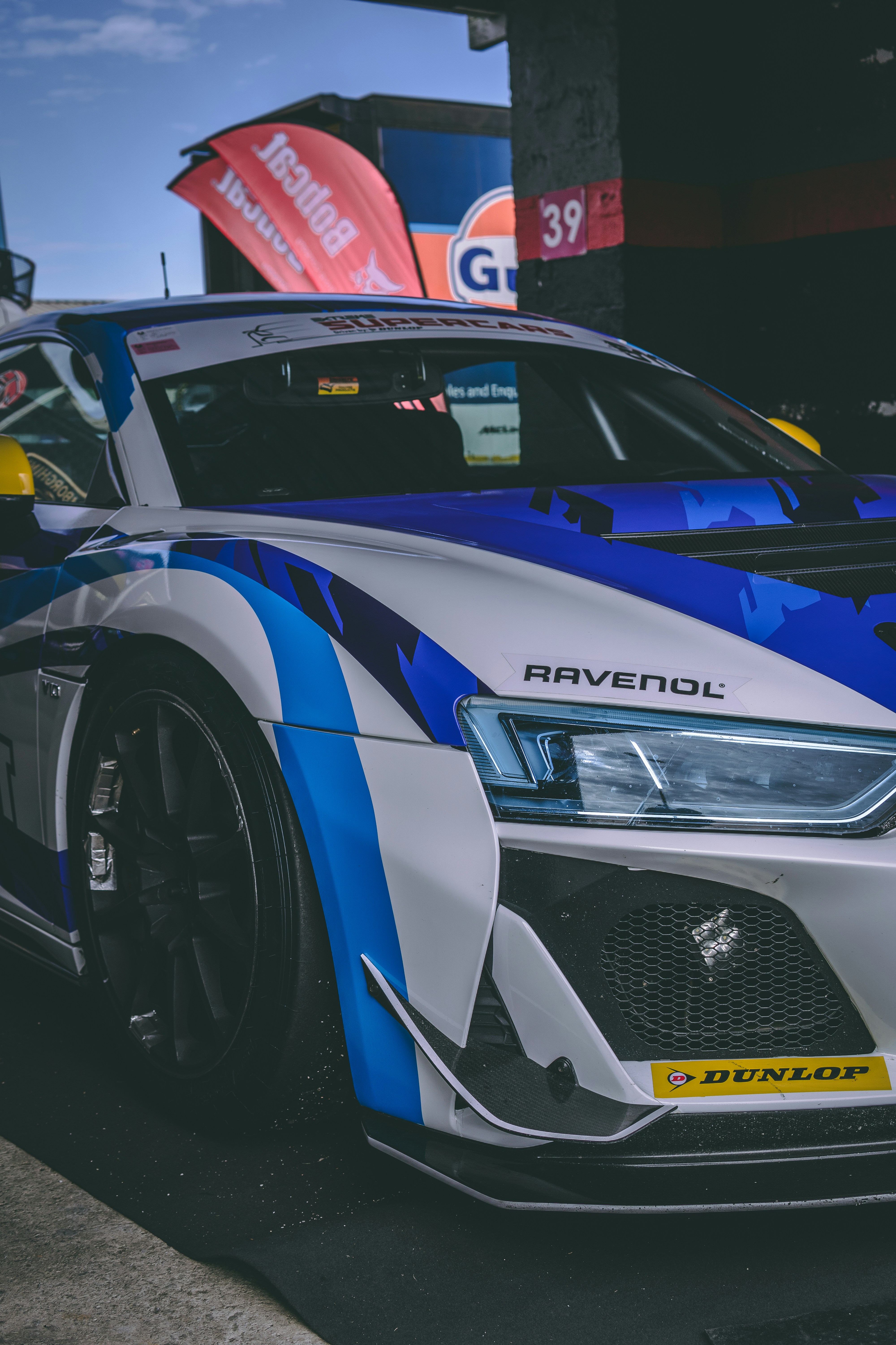 A racing car stands ready for competition. photo – Free Car Image on ...