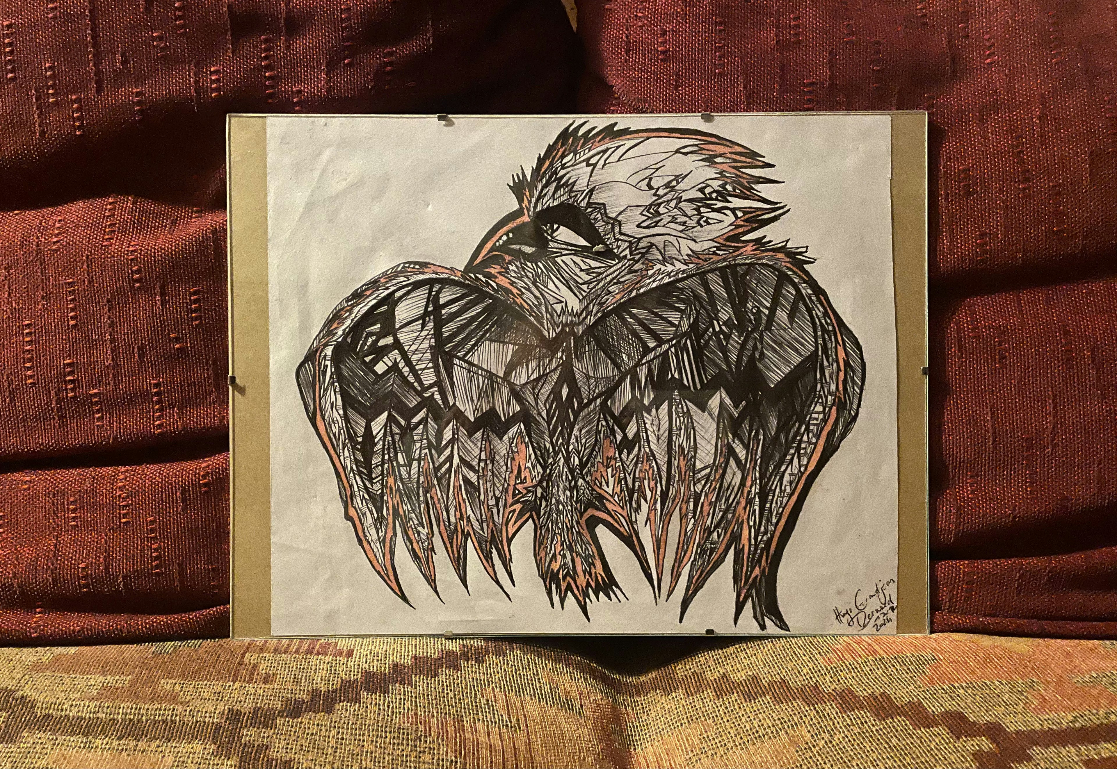 Ember-Wing Phoenix Sketch on Cream Mat, Resting by a Red Couch