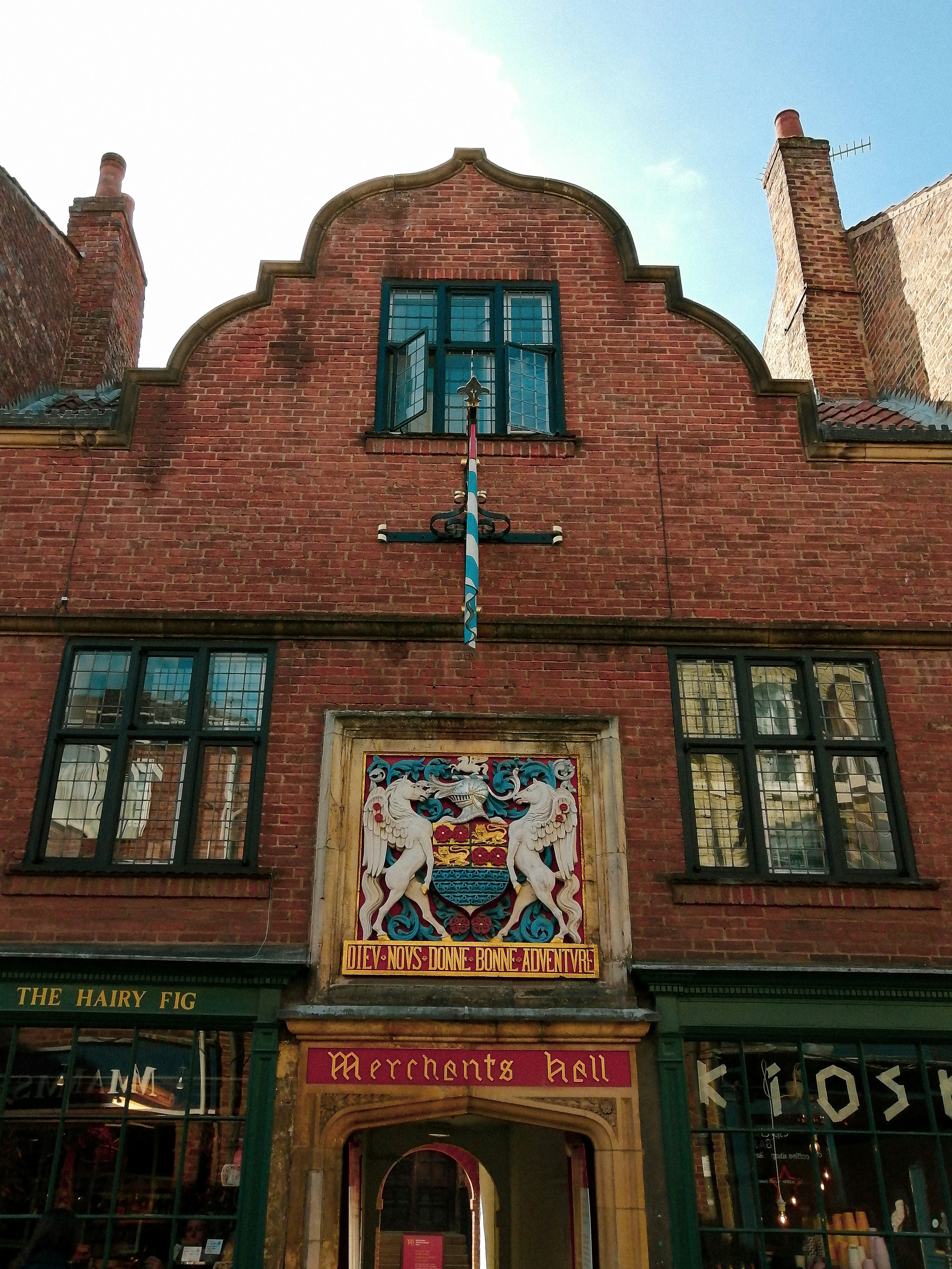 An old brick building with a detailed facade.