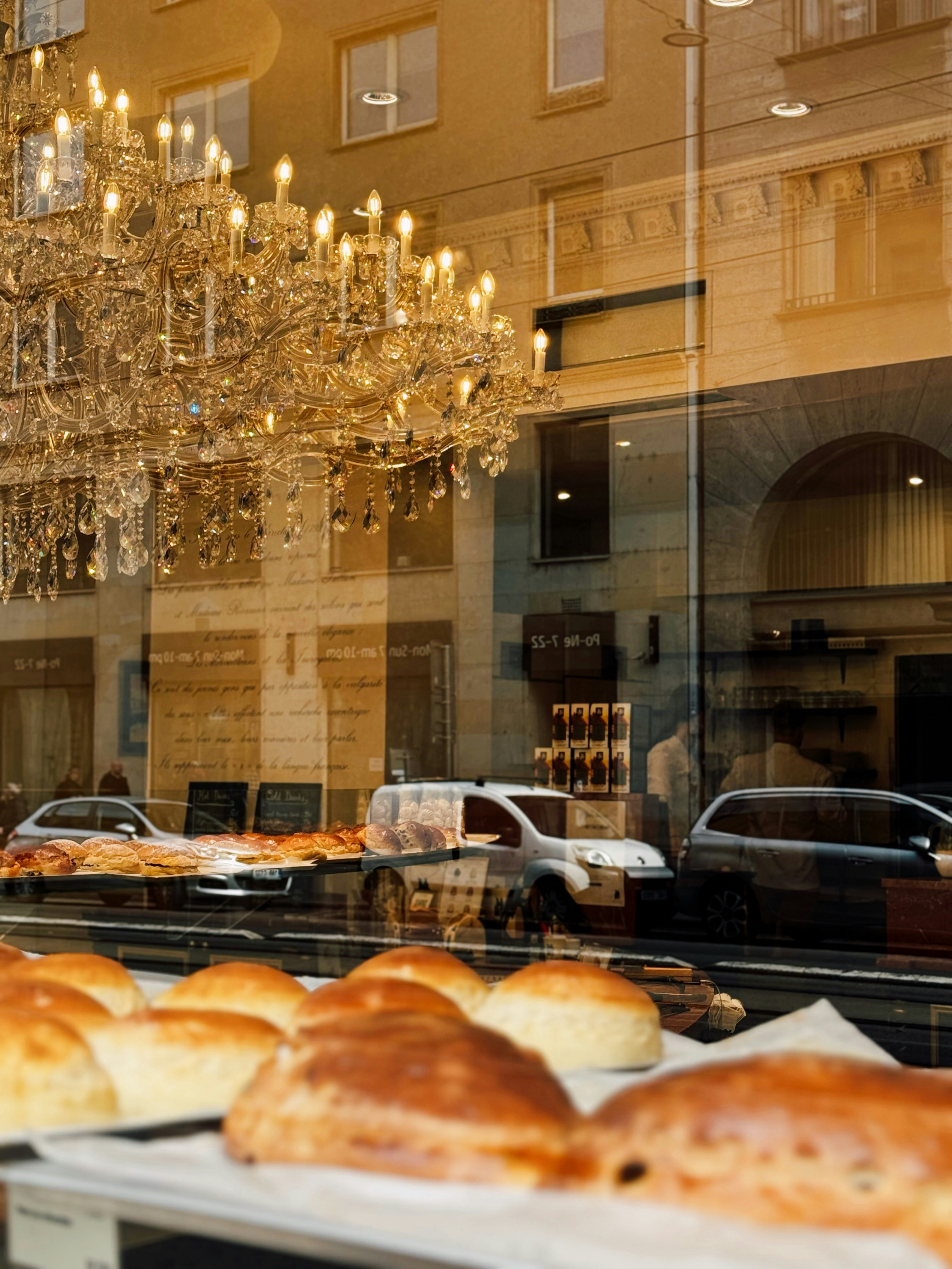 Pastries sit in a bakery window with a reflection. photo – Free Car ...