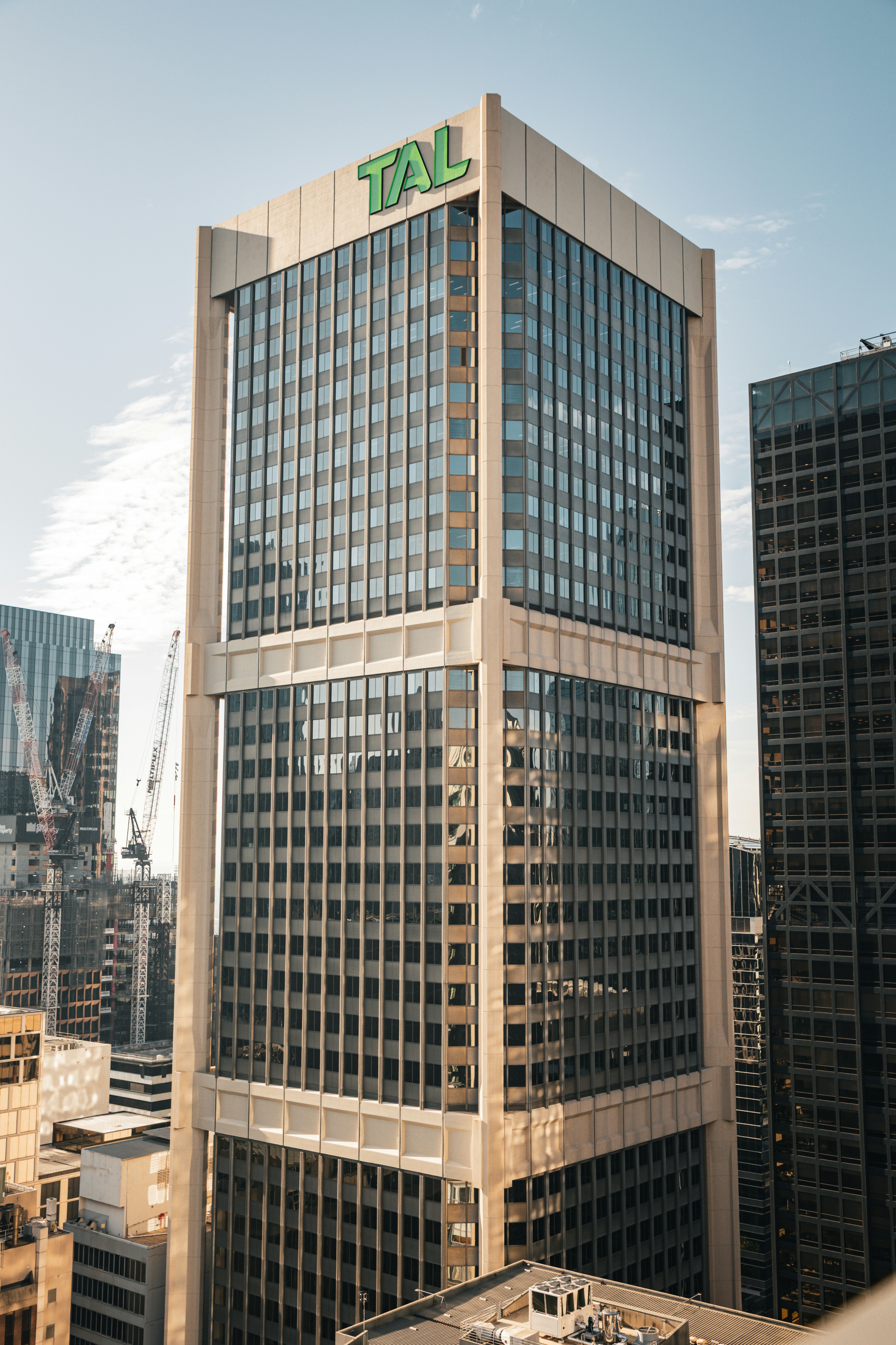 A tall building displays the name "tal." photo – Free City Image on ...