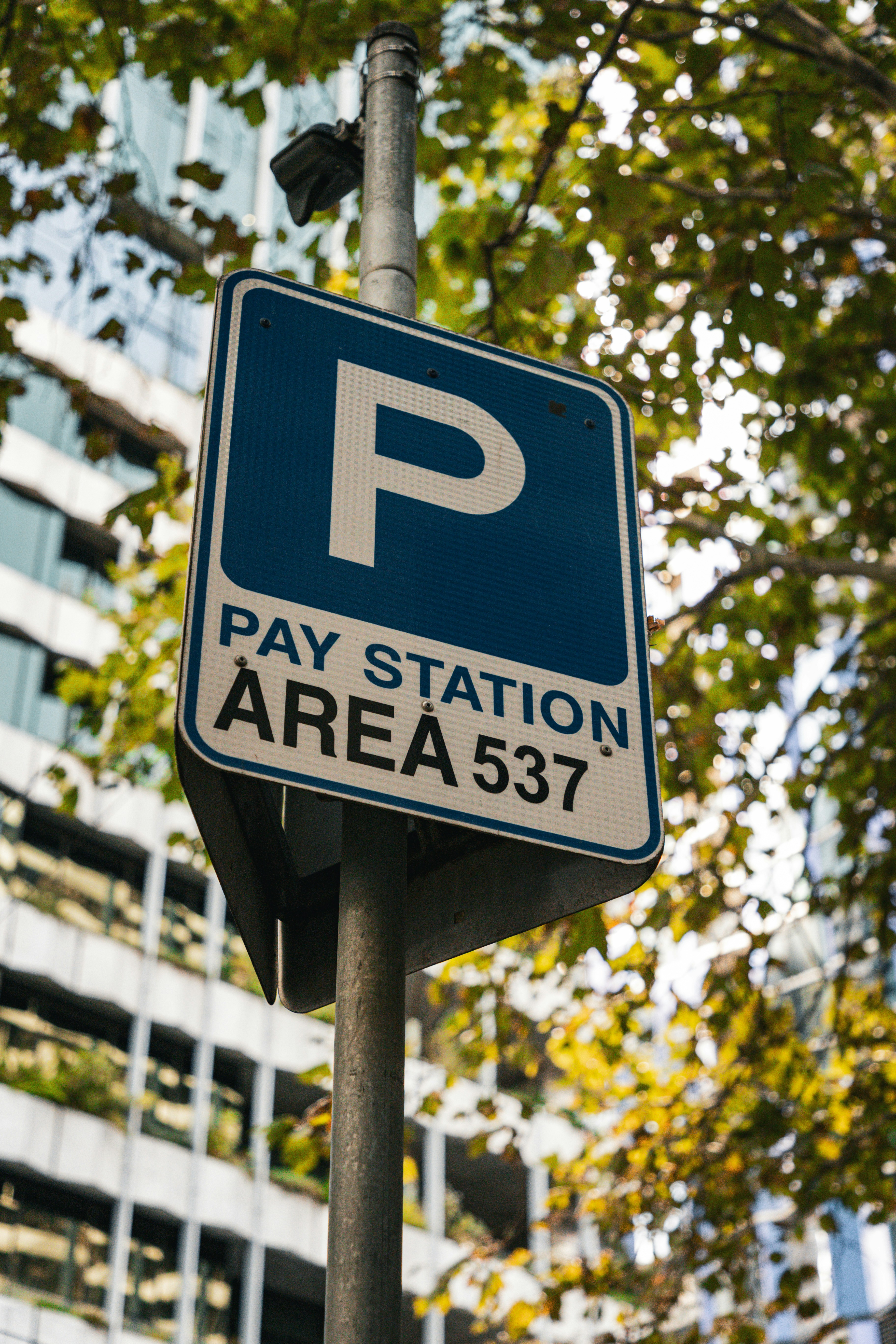 Parking sign indicates a pay station in area 537. photo – Free City ...