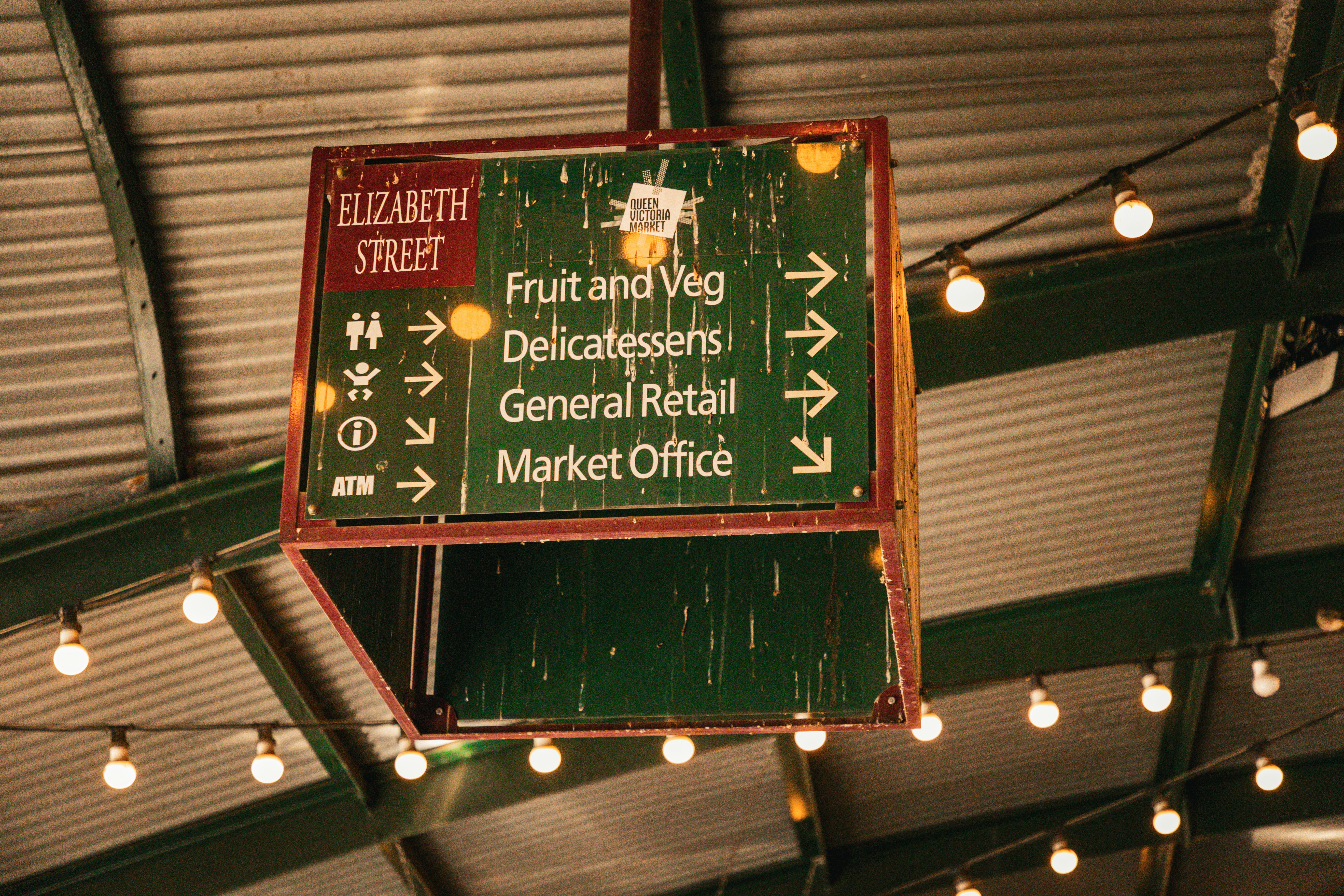 Under the Market Sign: Ethereal Lights in a Cedar Market Hall