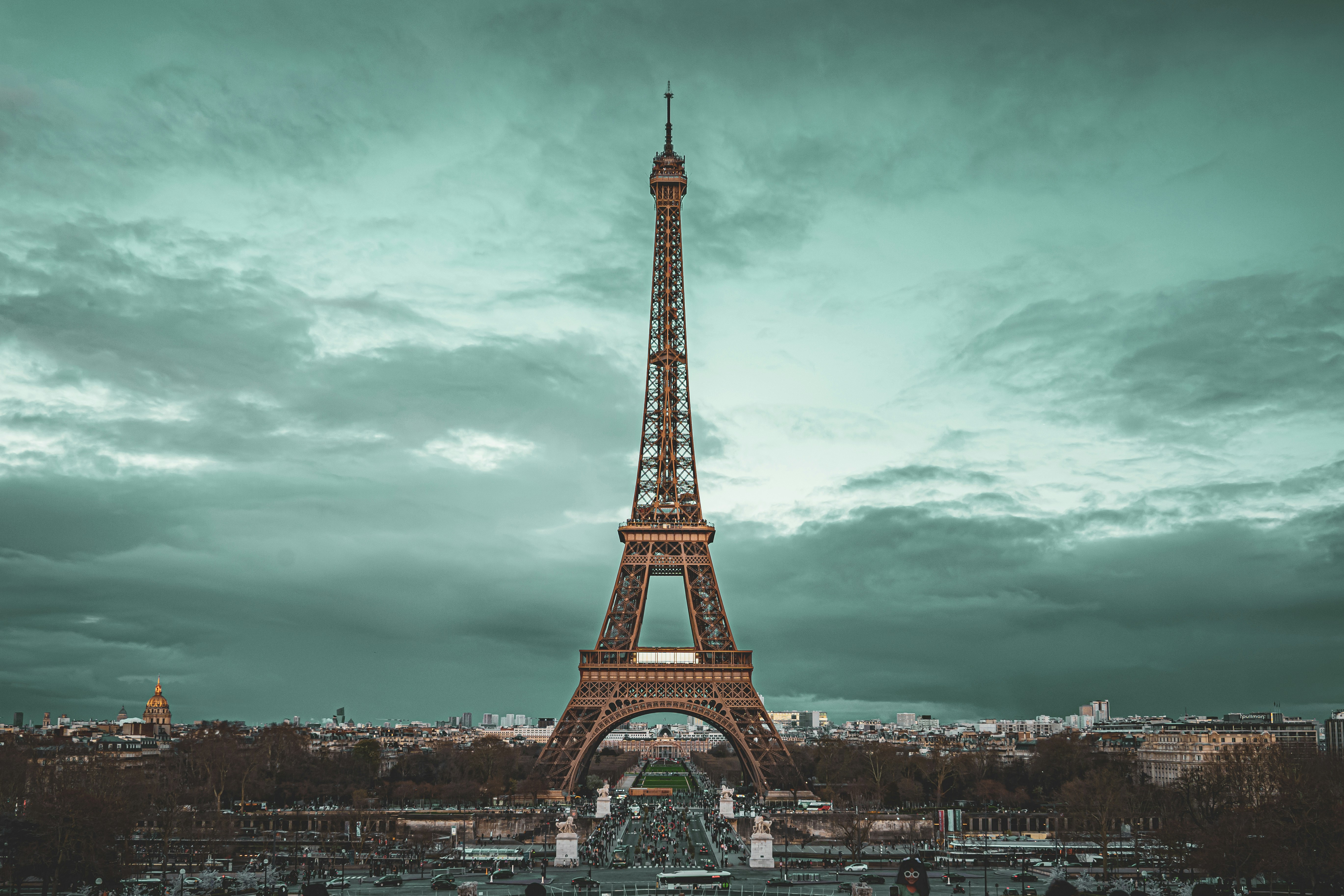 Teal Skies Over Iron Lace: Eiffel Tower by the Seine