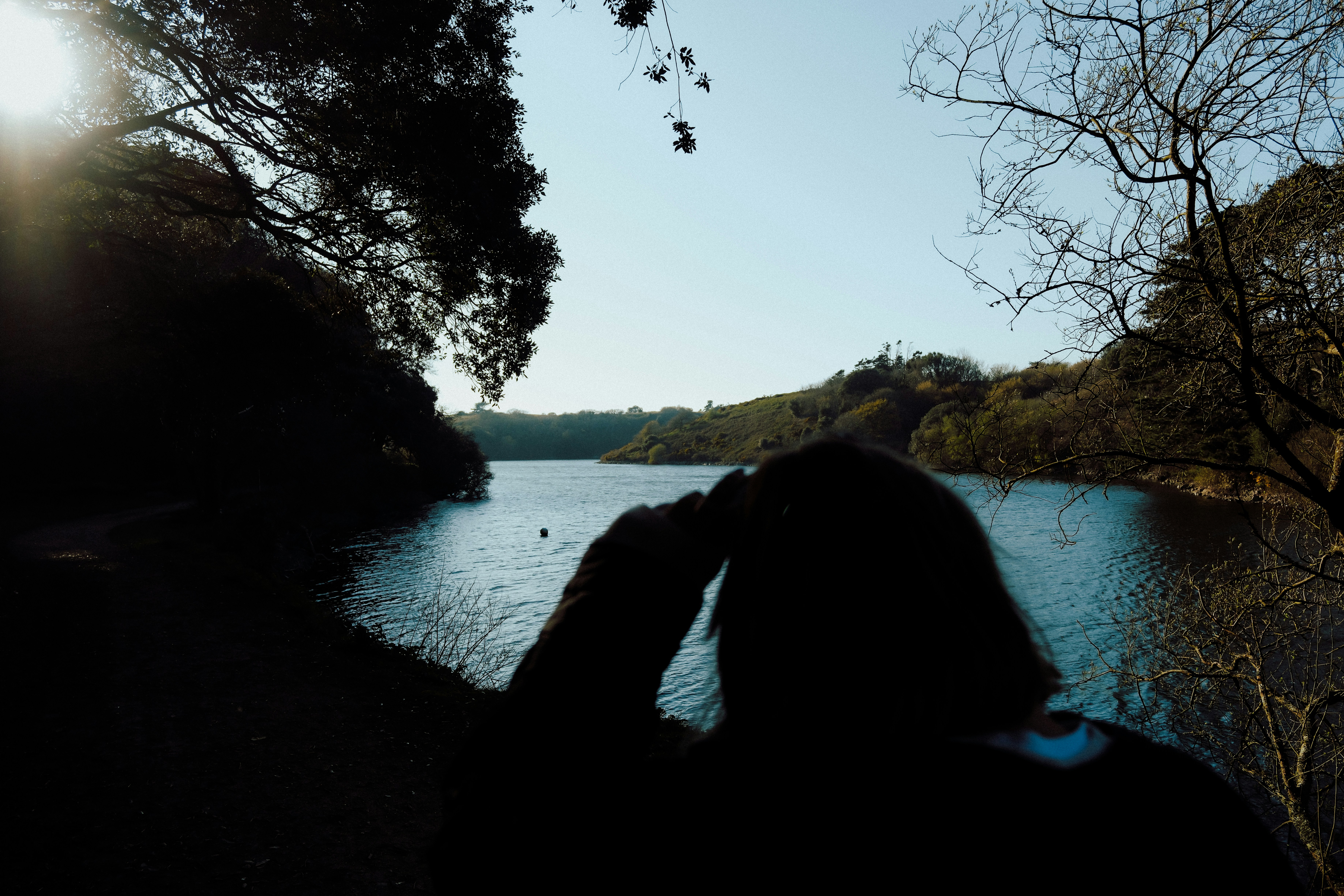 Silhouette at Sunset by the Lake