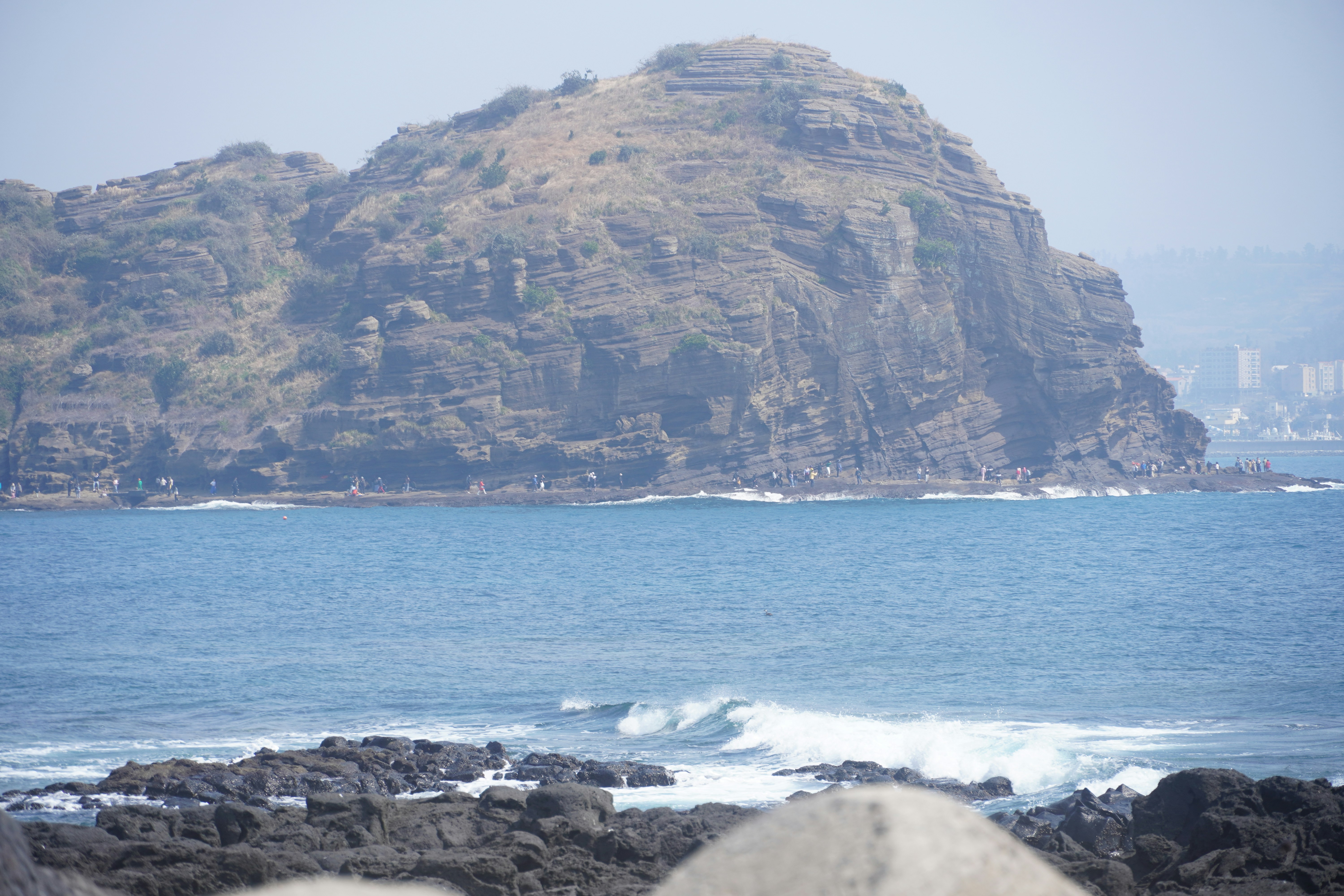 Coastal Tranquility Amid Rugged Cliffs