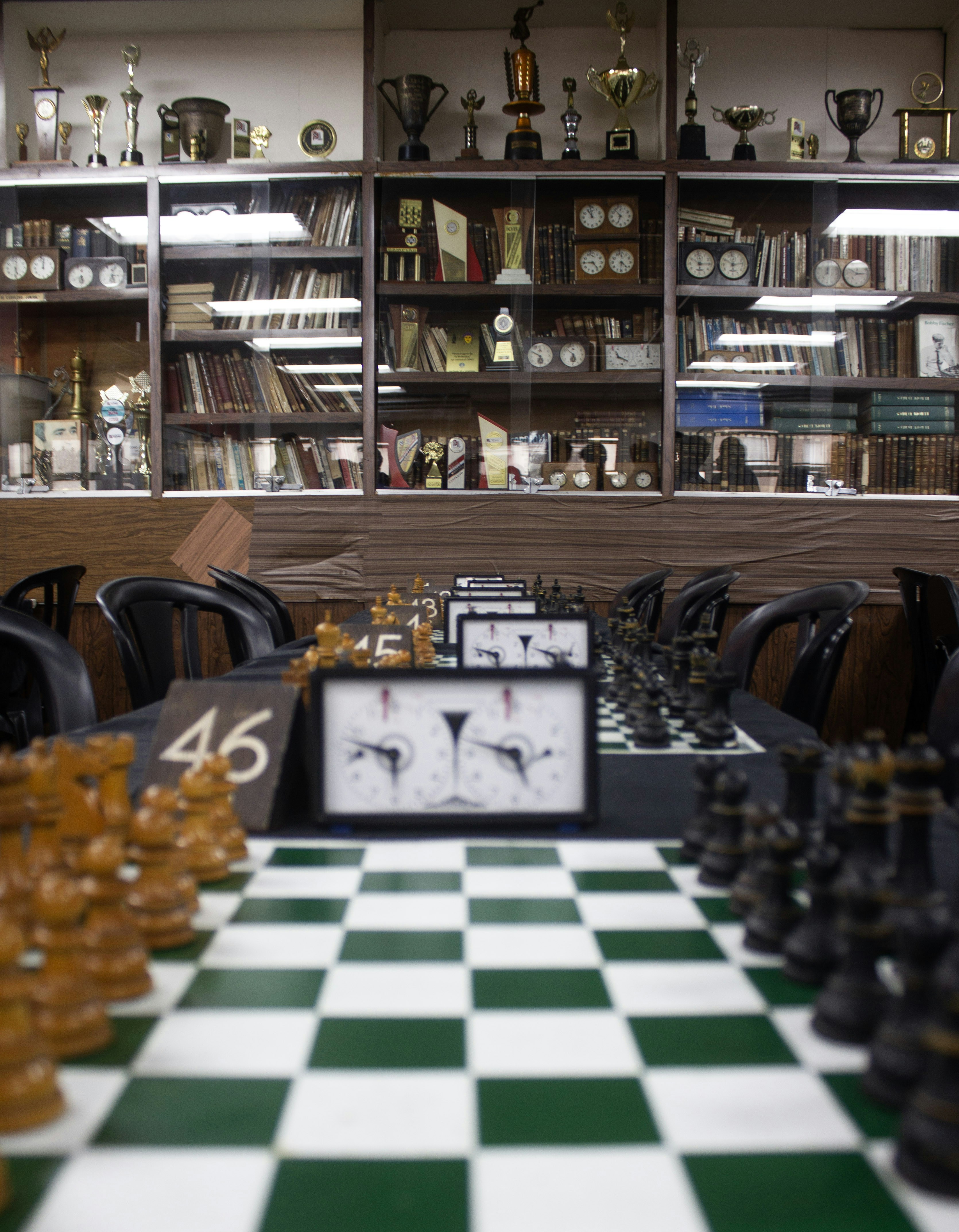 Chessboards sit ready in a competition room. photo – Free Chess Image ...
