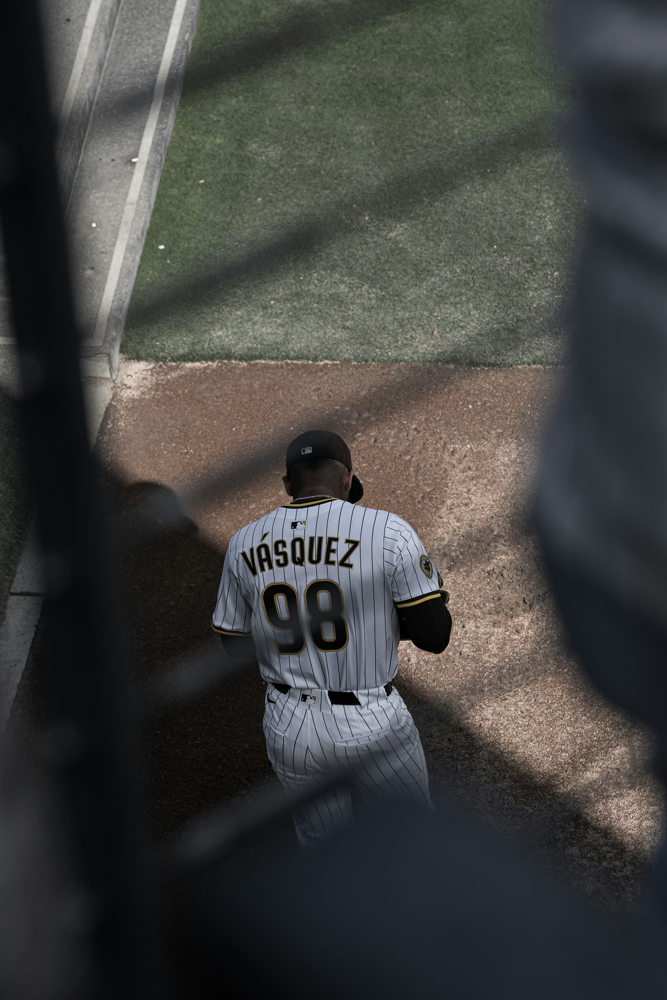 A baseball player, vasquez, stands on the field. photo – Free Man Image ...