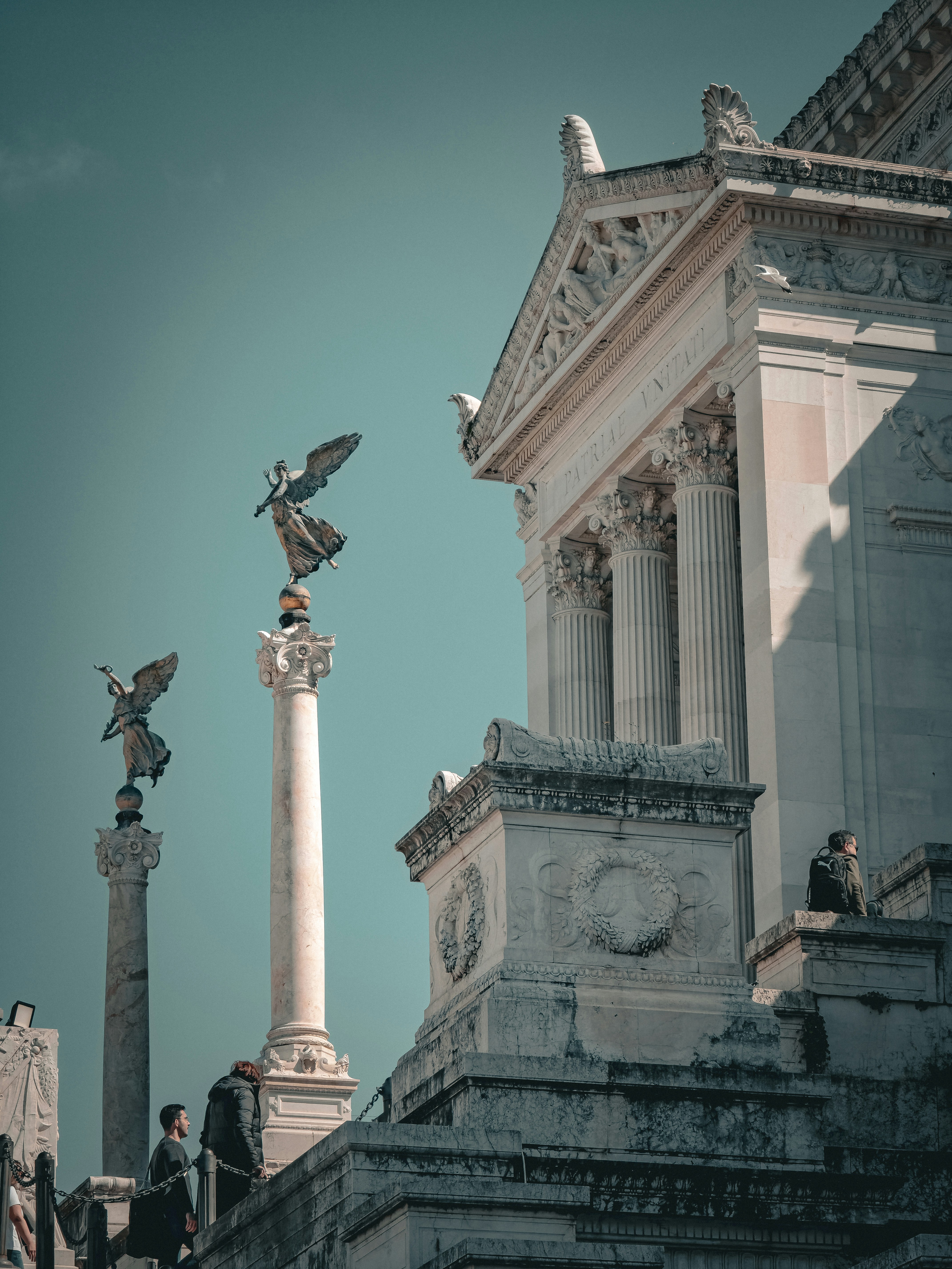 Angels grace the facade of an impressive monument. photo – Free ...