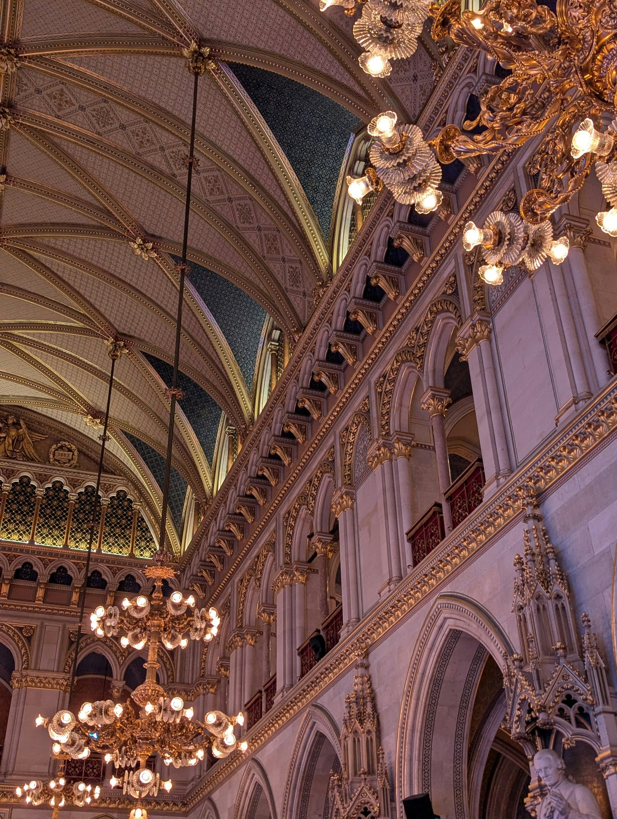 Gothic architecture features ornate ceilings and chandeliers. photo ...