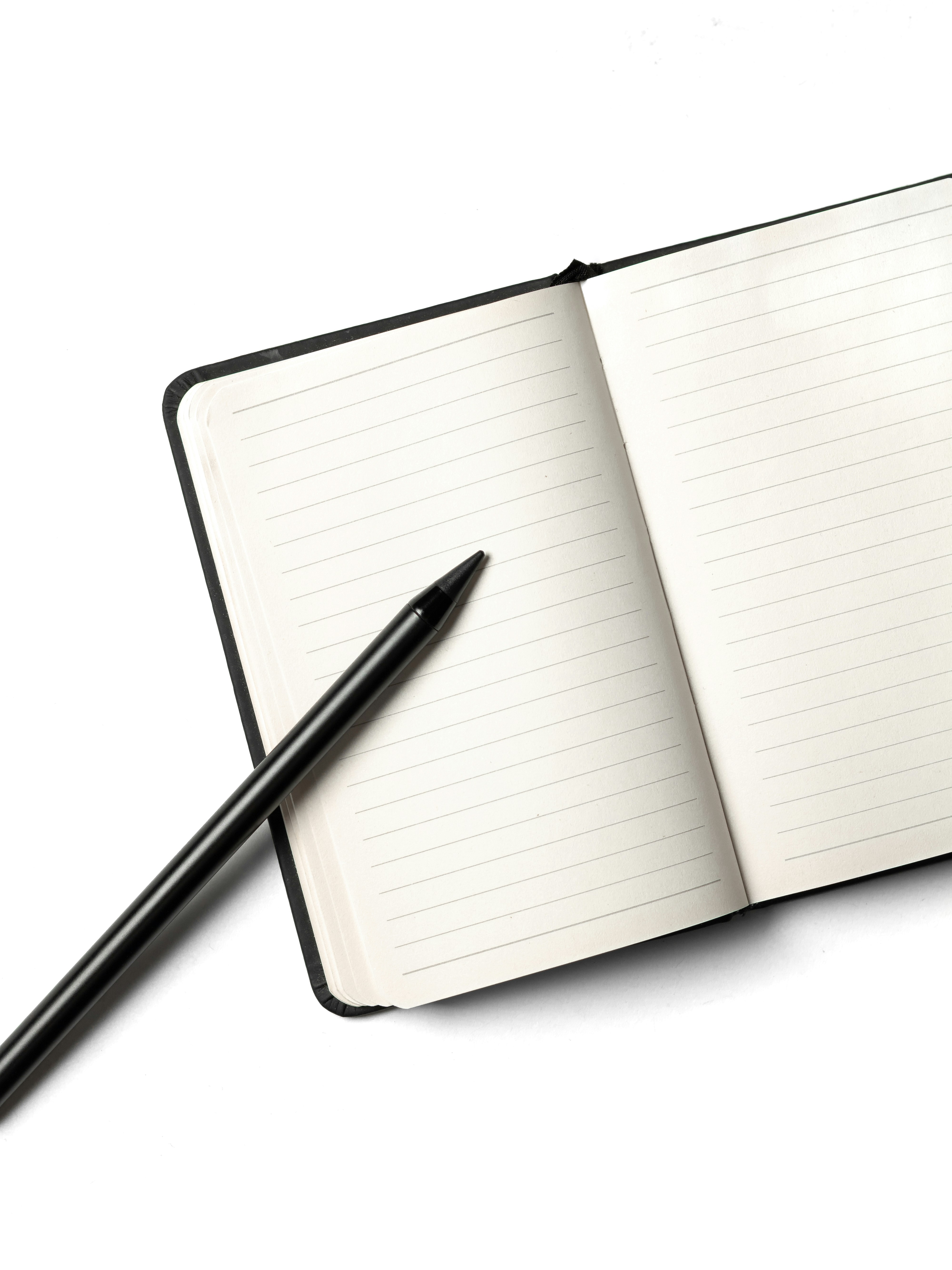 Notebook with a pencil on top. photo – Free Office Image on Unsplash