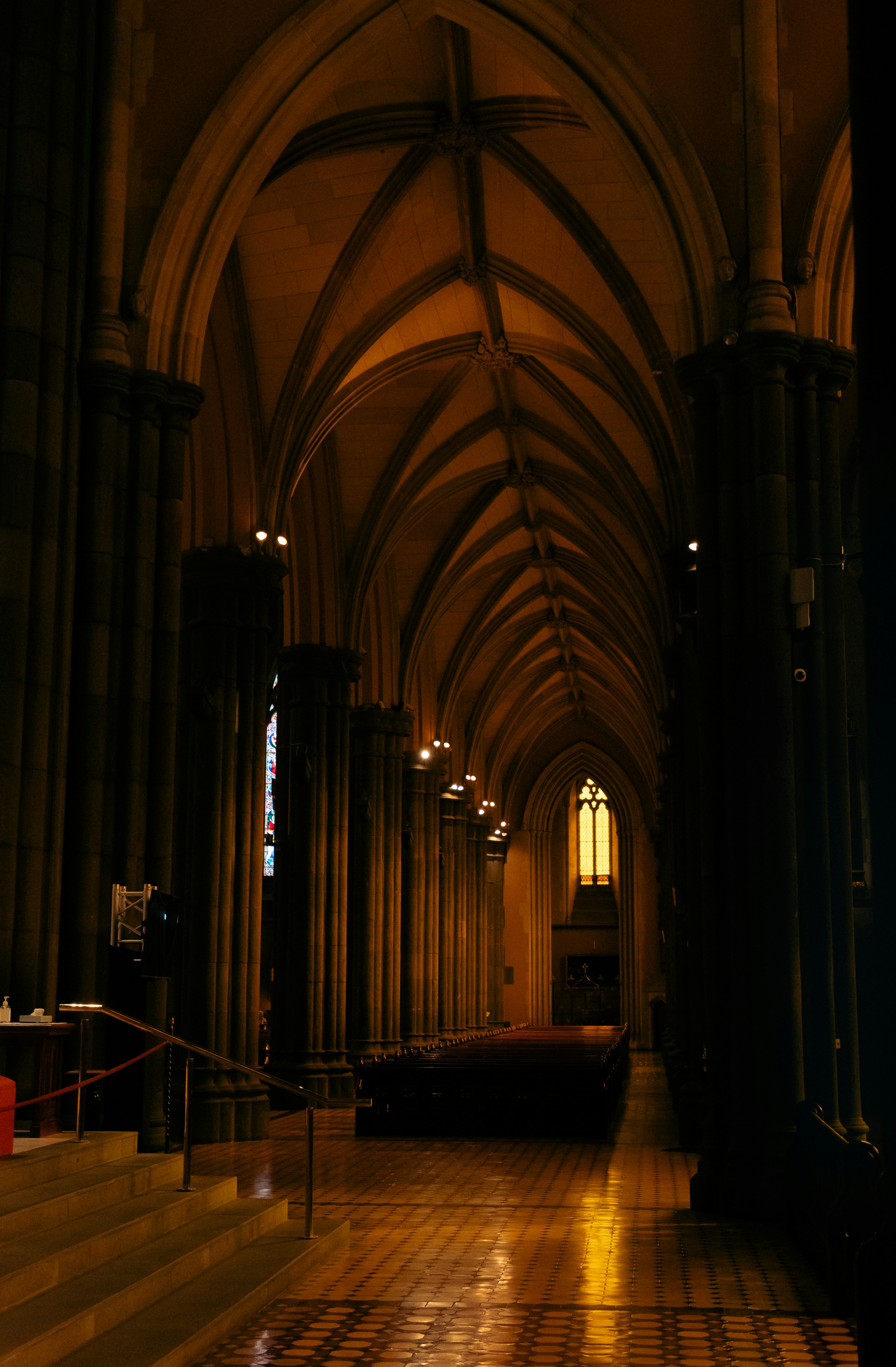 Amber Veil: A Gothic Cathedral Nave at Dusk