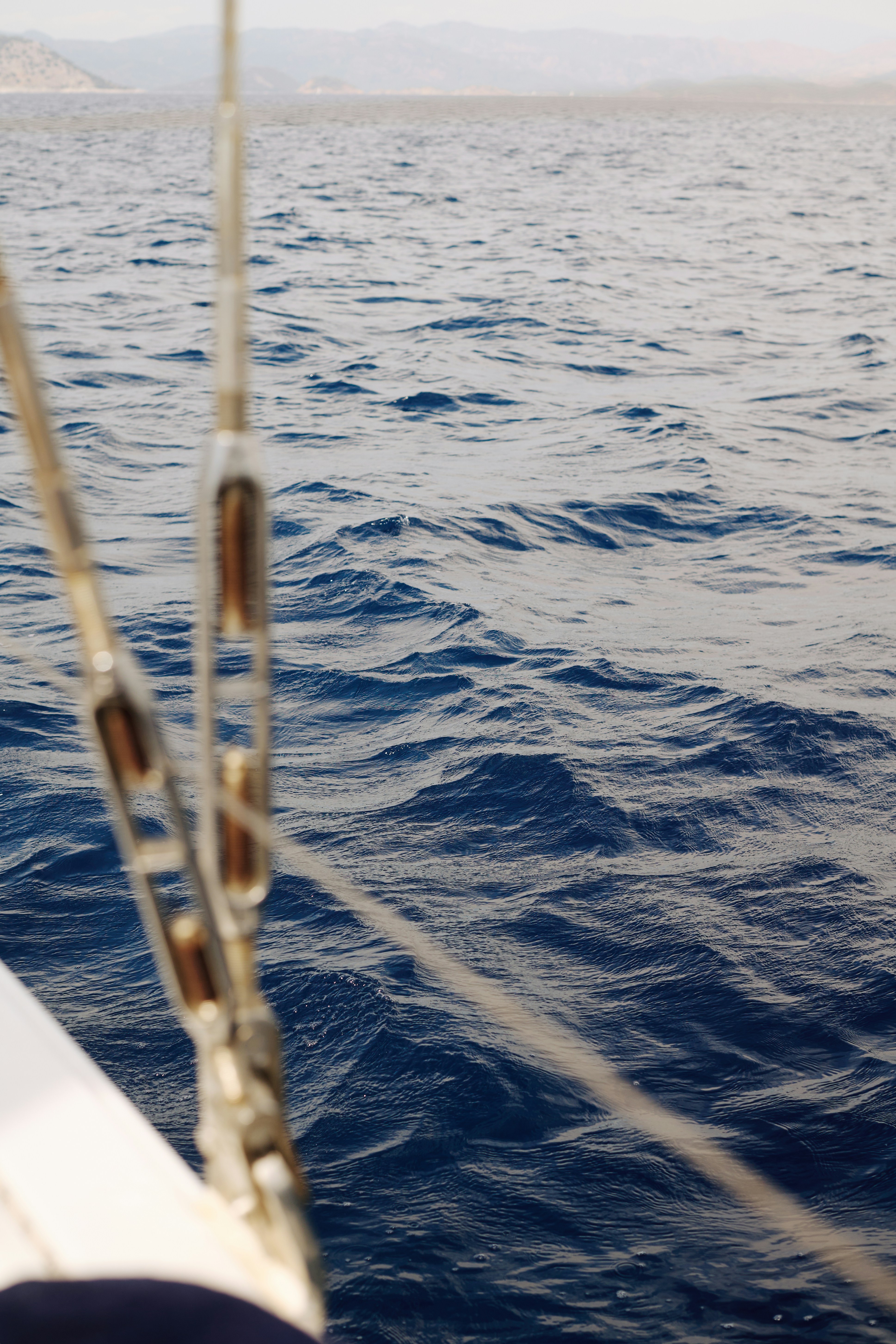 Sailing on the ocean with rigging in the foreground. photo – Free ...