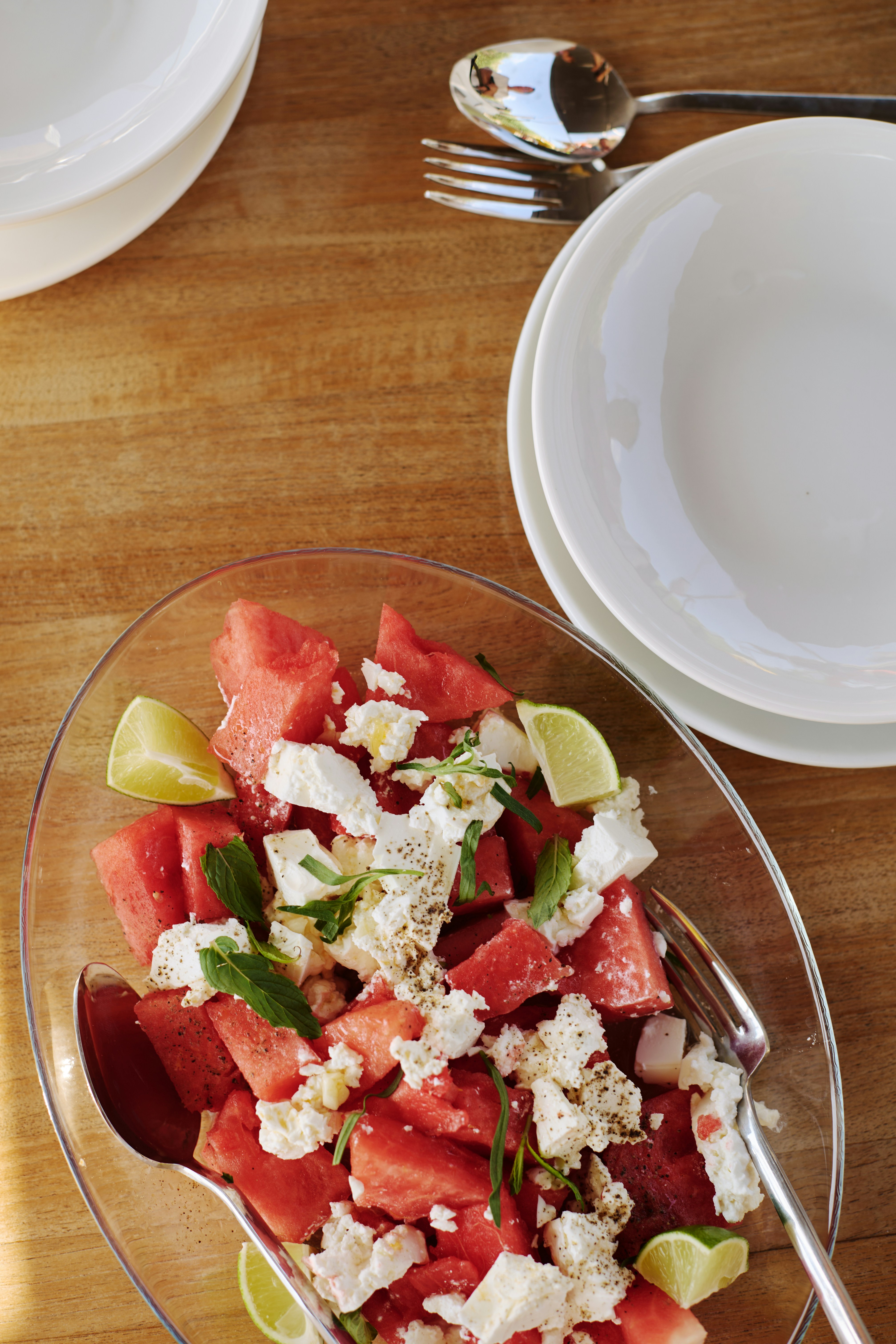 Watermelon Feta Mosaic: Fresh Summer Bowl at Table Edge
