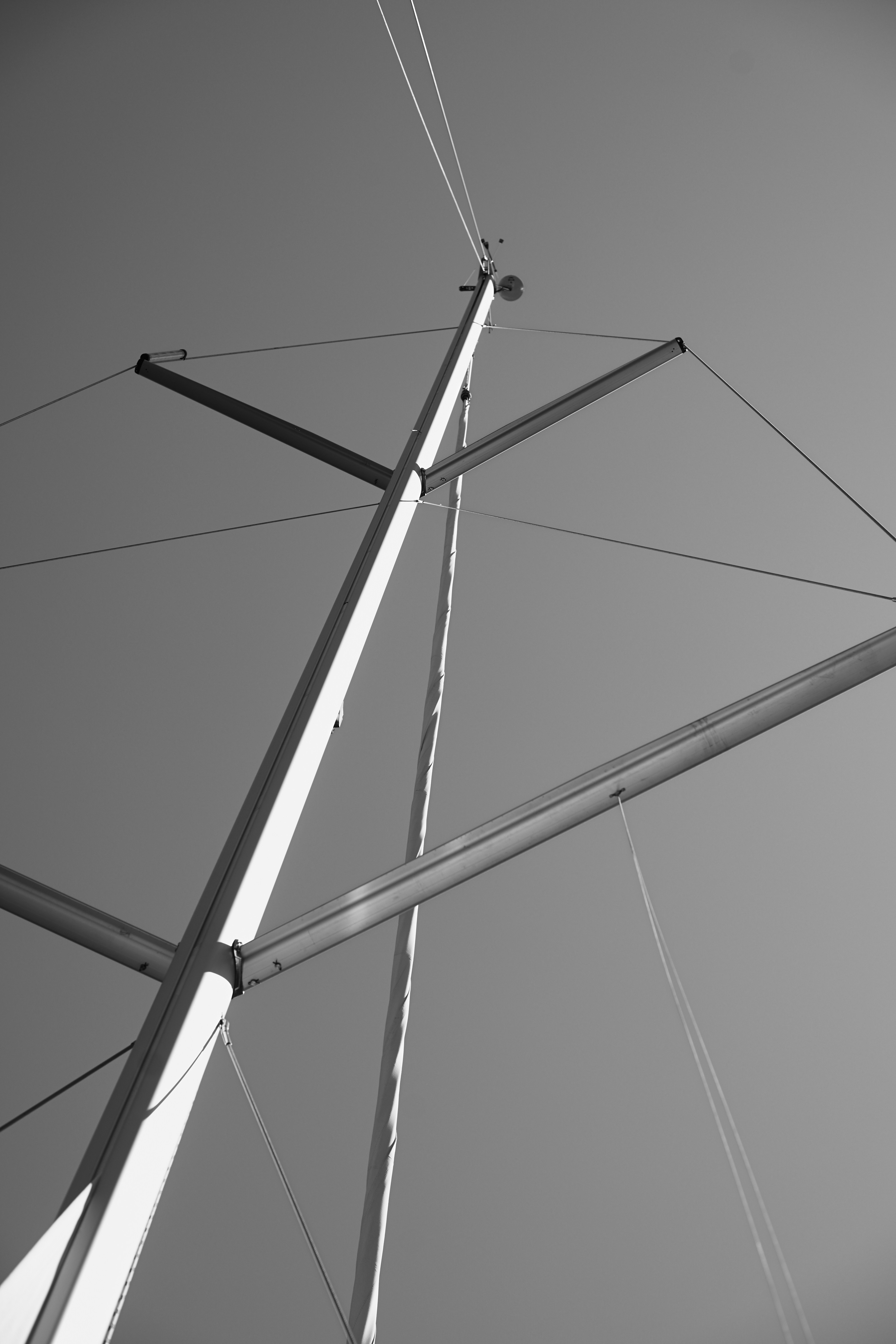 Sailboat Mast Against a Clear Sky