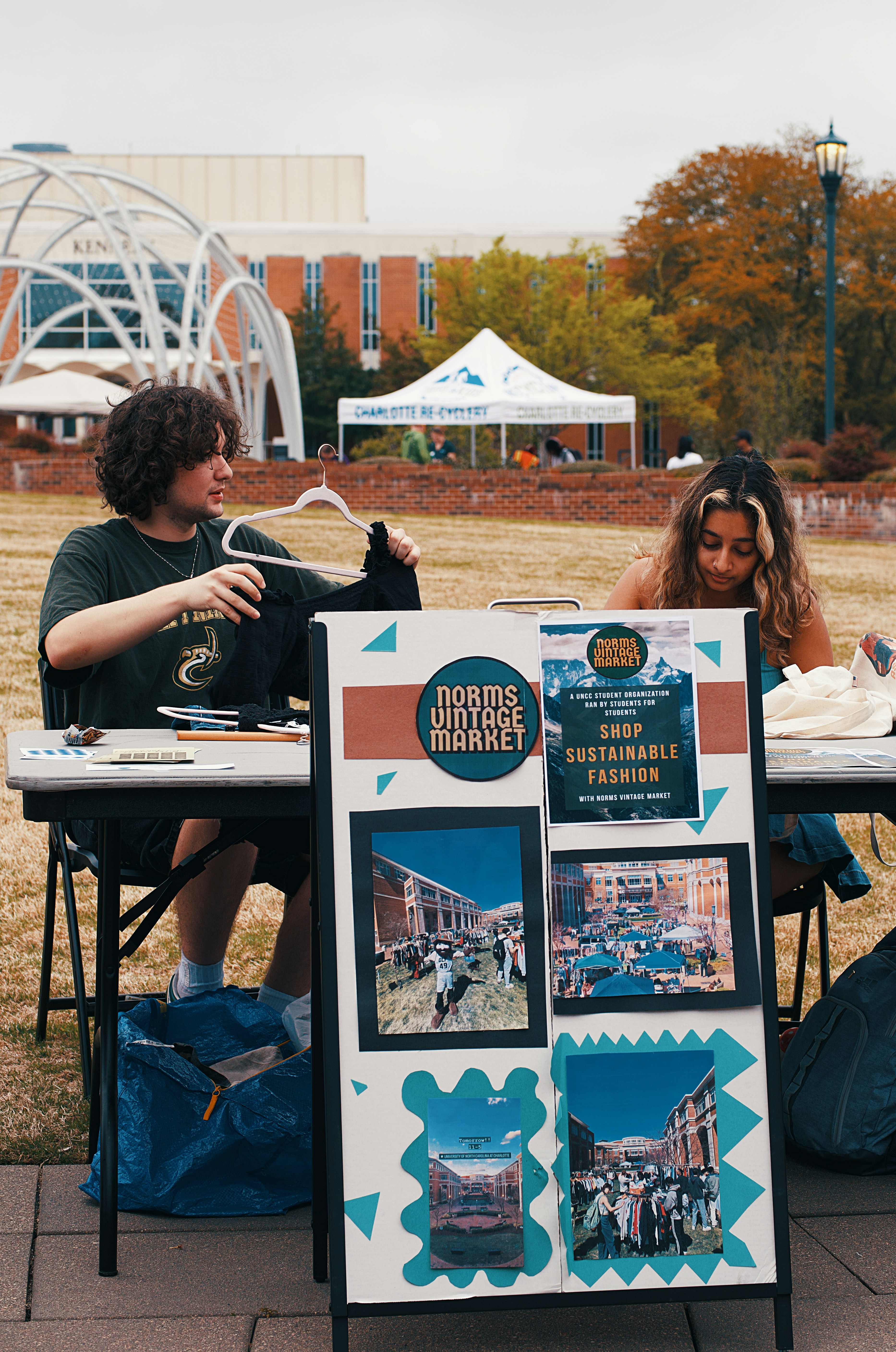 Two Vendors at a Vintage Market Board in Autumn Park