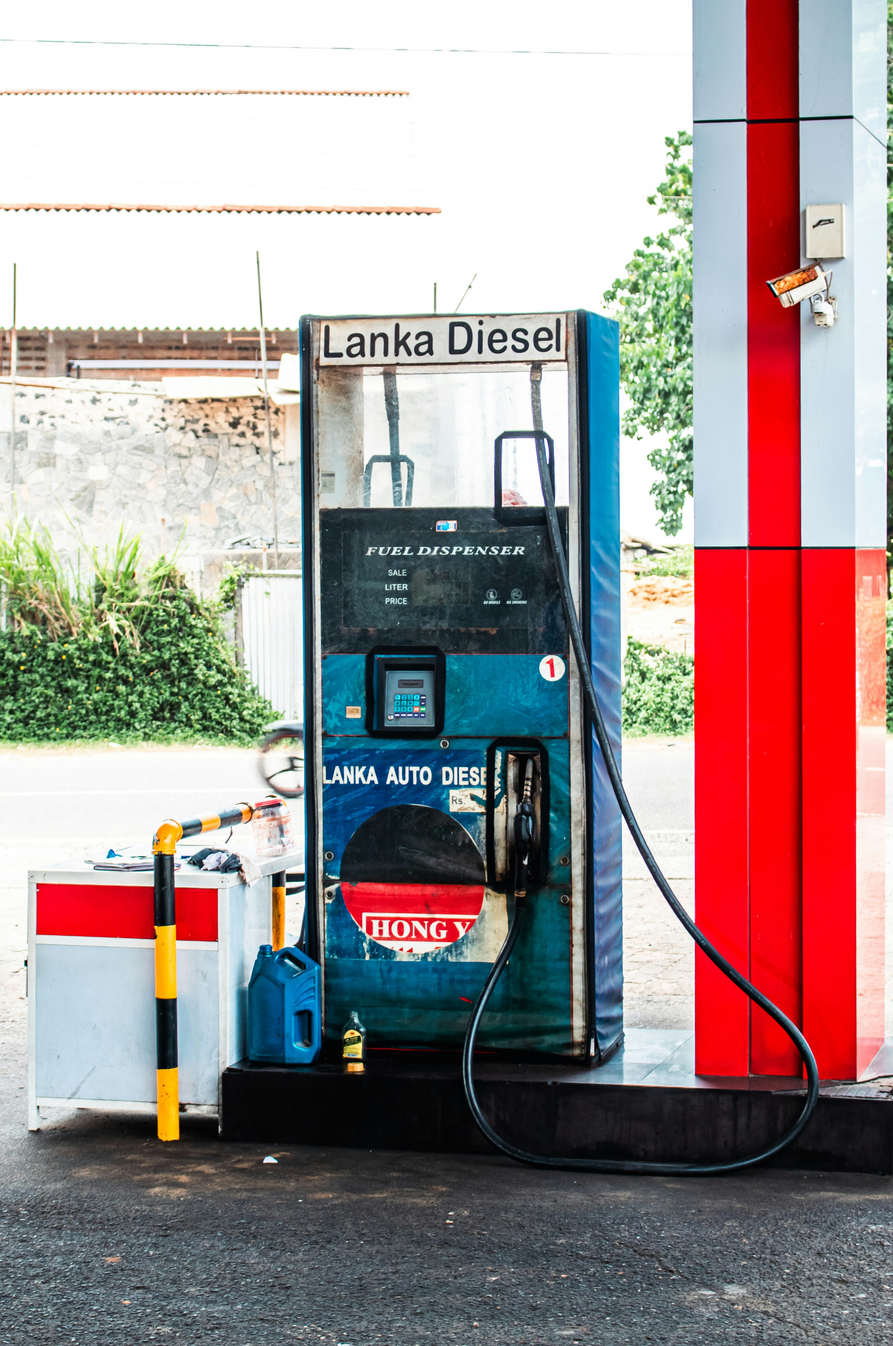 A lanka diesel fuel dispenser stands at a gas station. photo – Free ...