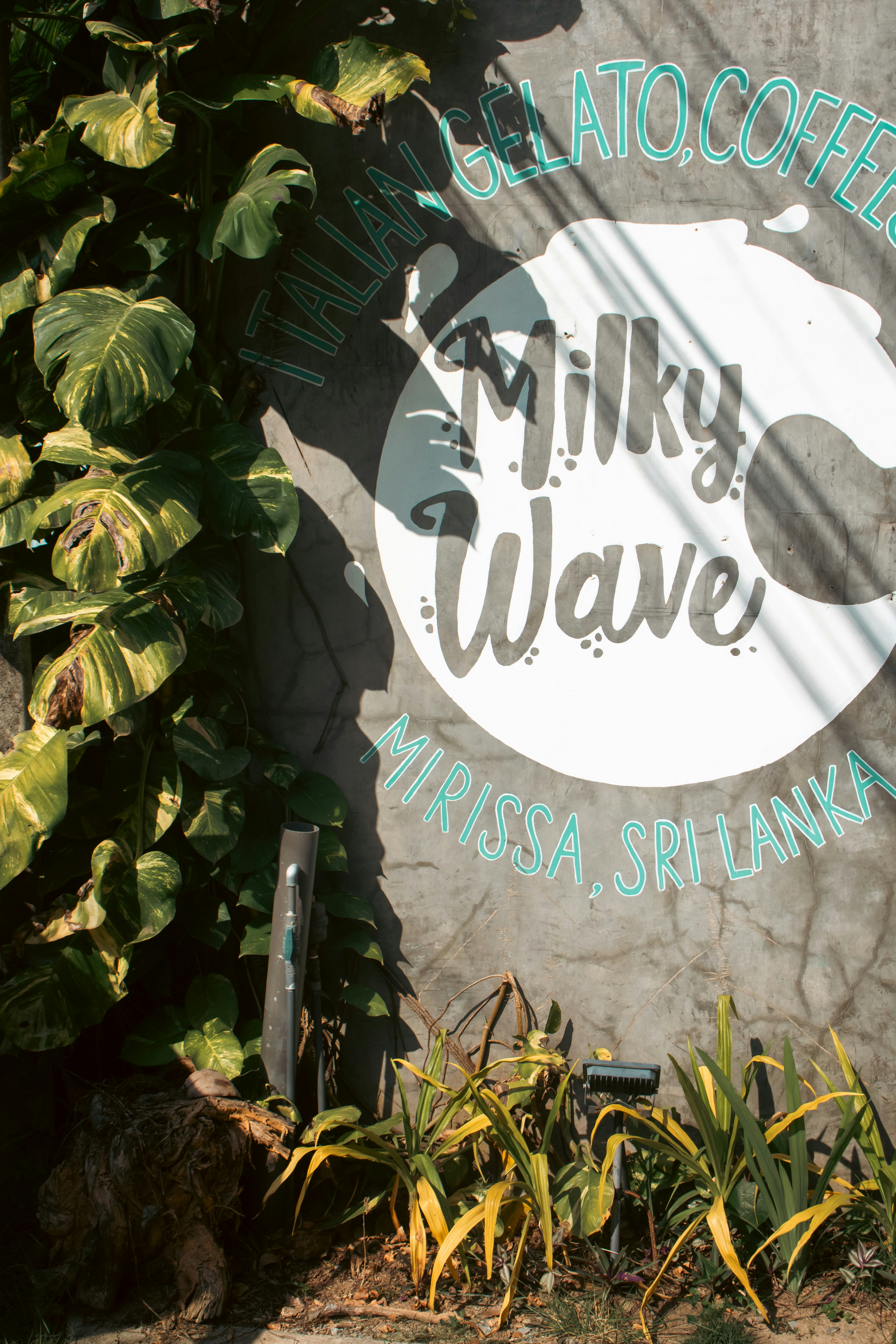 A painted restaurant entrance sign