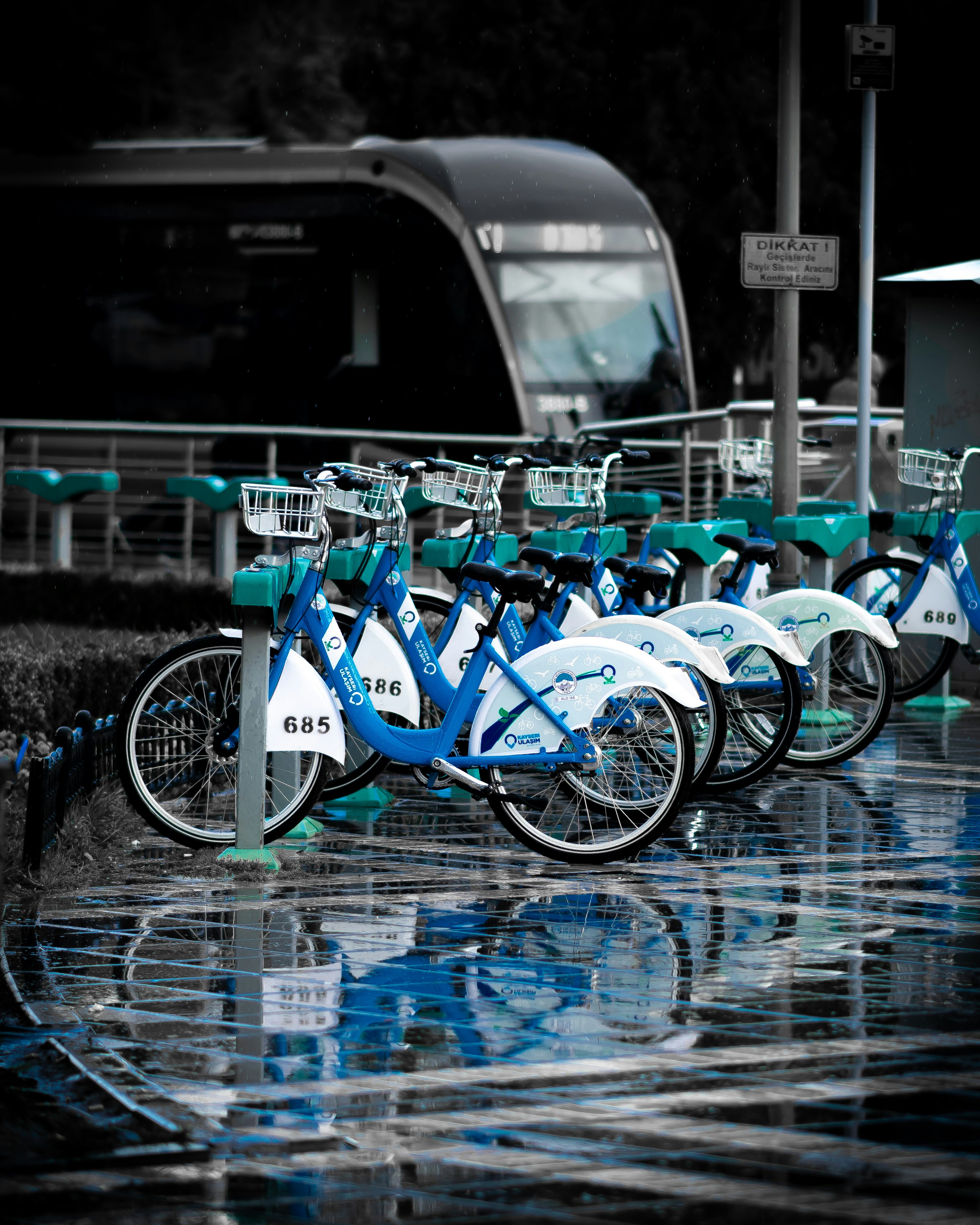 Urban Reflections: Bicycles and Trams in Motion