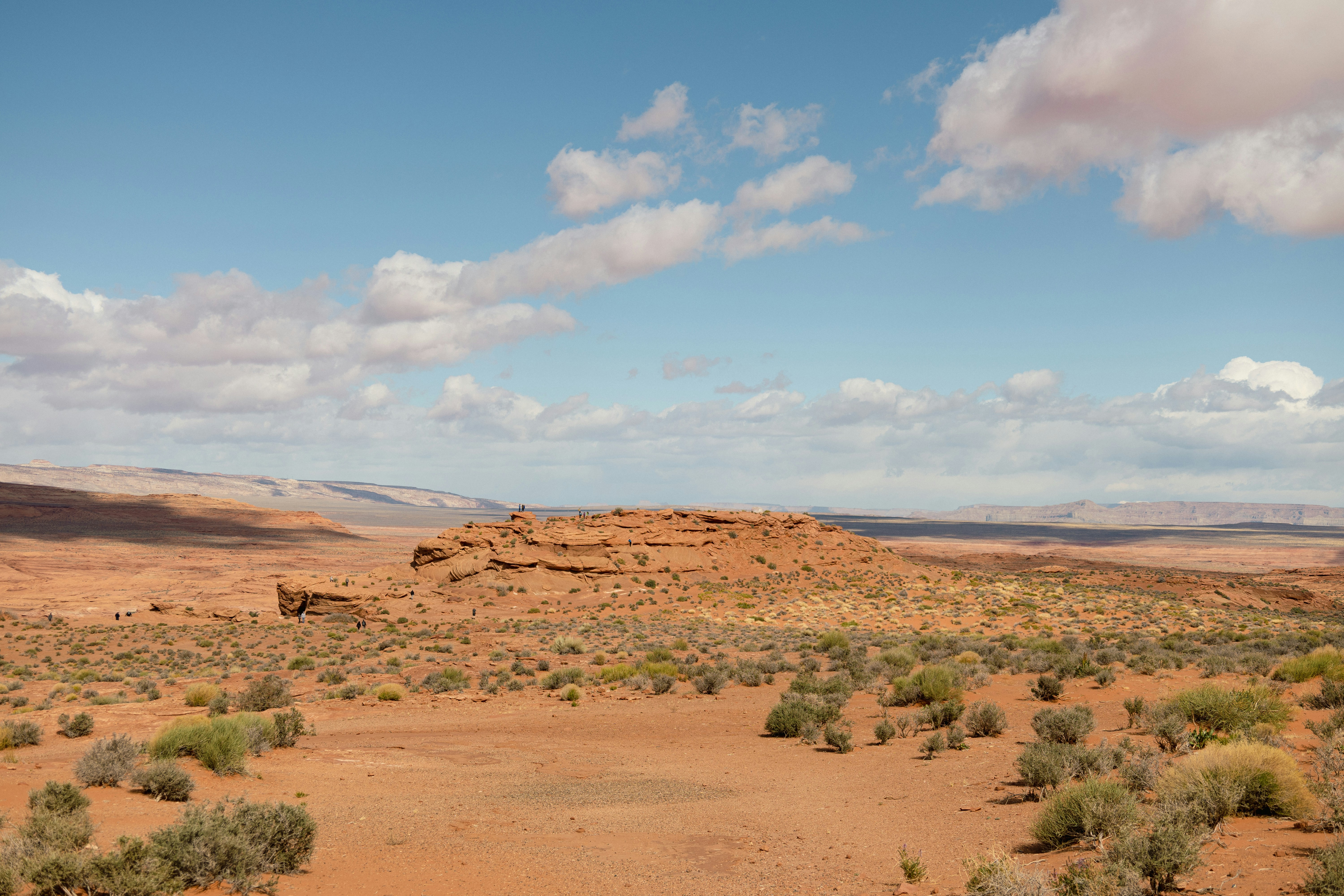 Desert landscape with a distant rock formation. photo – Free Desert ...