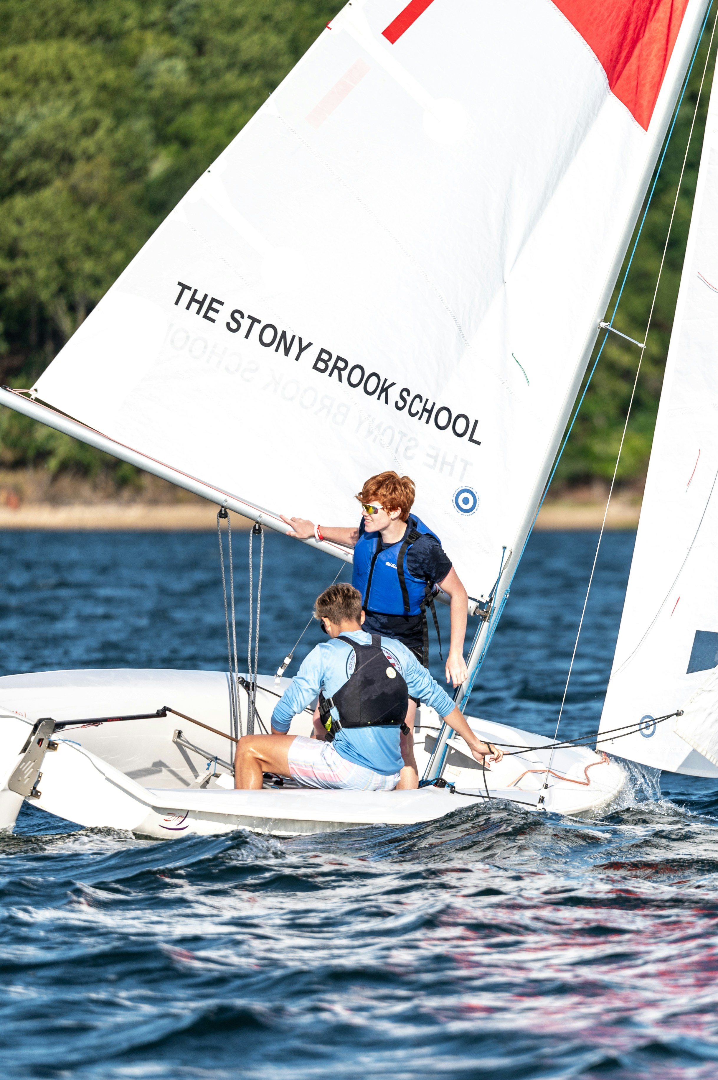 Students sail a boat with "the stony brook school" on it. photo – Free ...