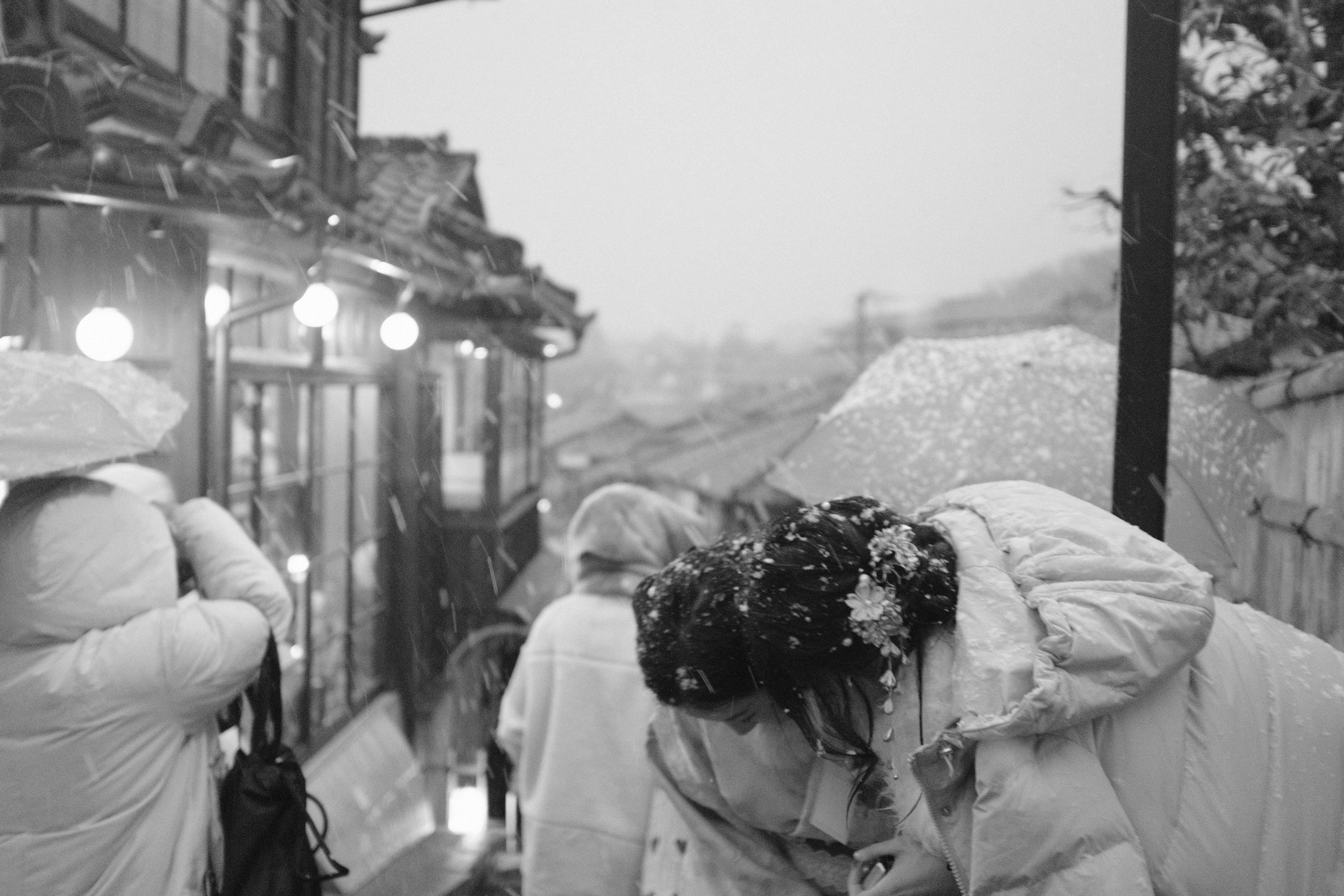 Snowfall on Historic Lantern-Lit Street