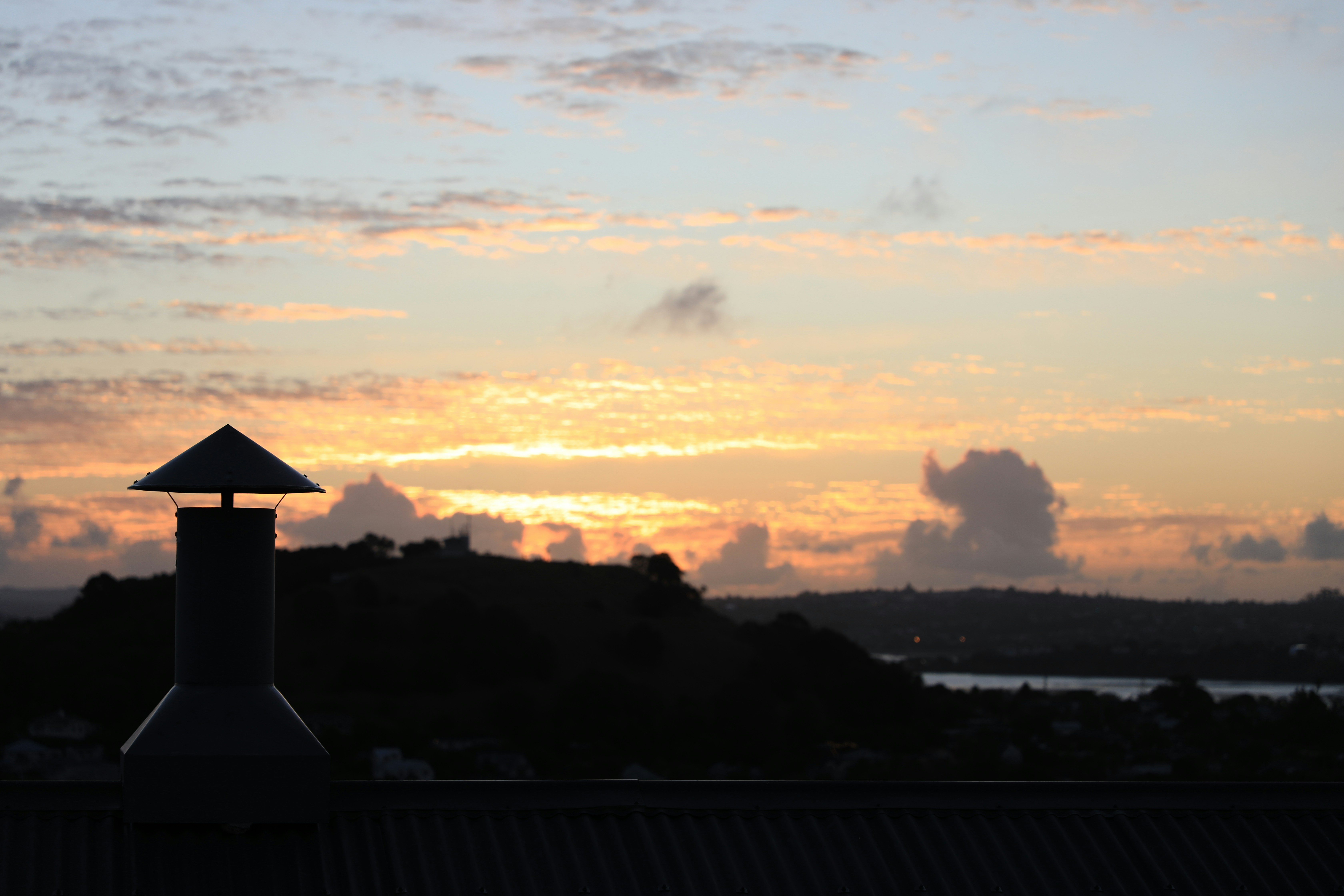 Sunset Silhouette: Chimney Peak Against a Quiet Horizon