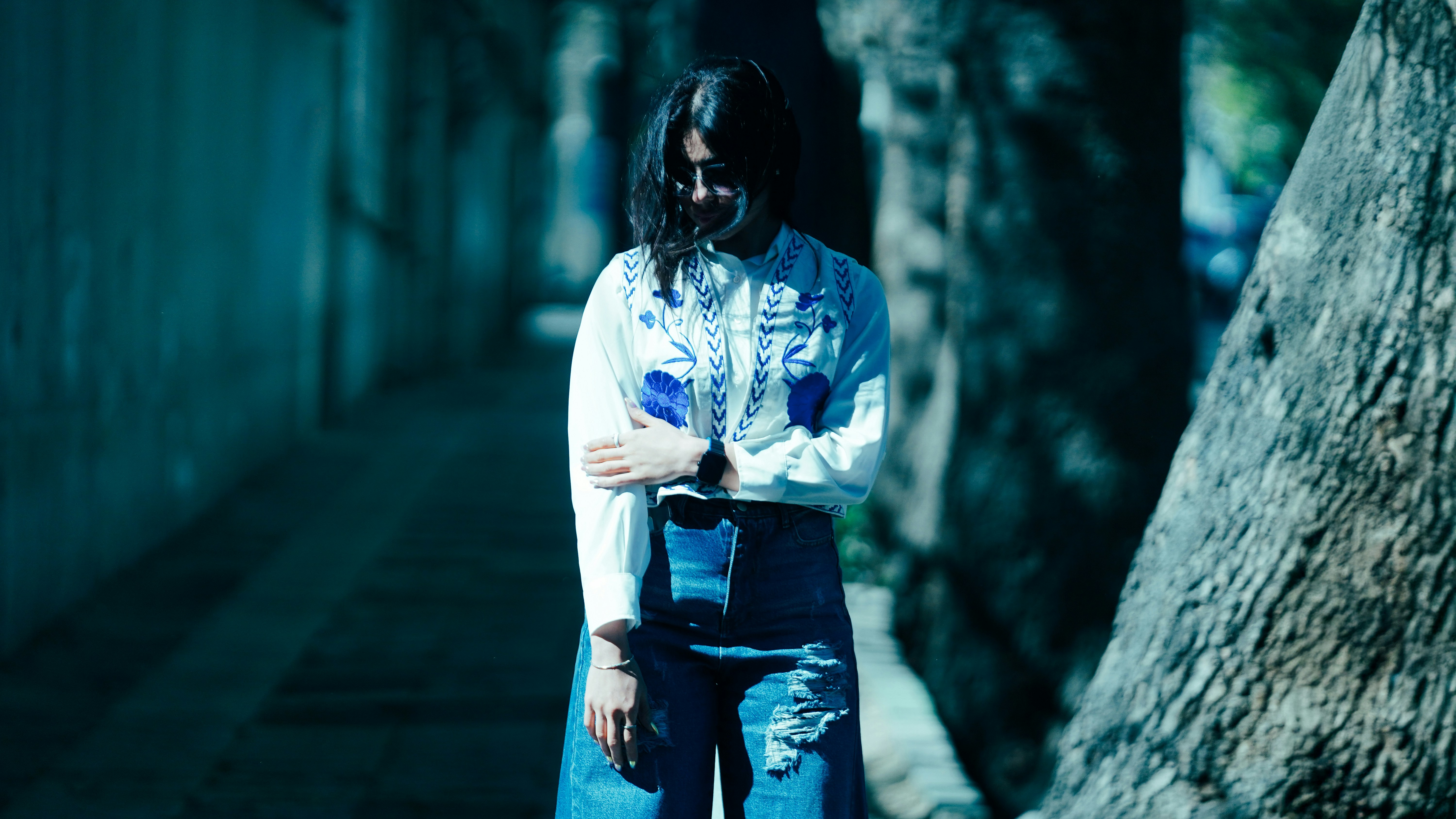 Embroidered Quiet: Portrait in a Blue-Tinted Alley