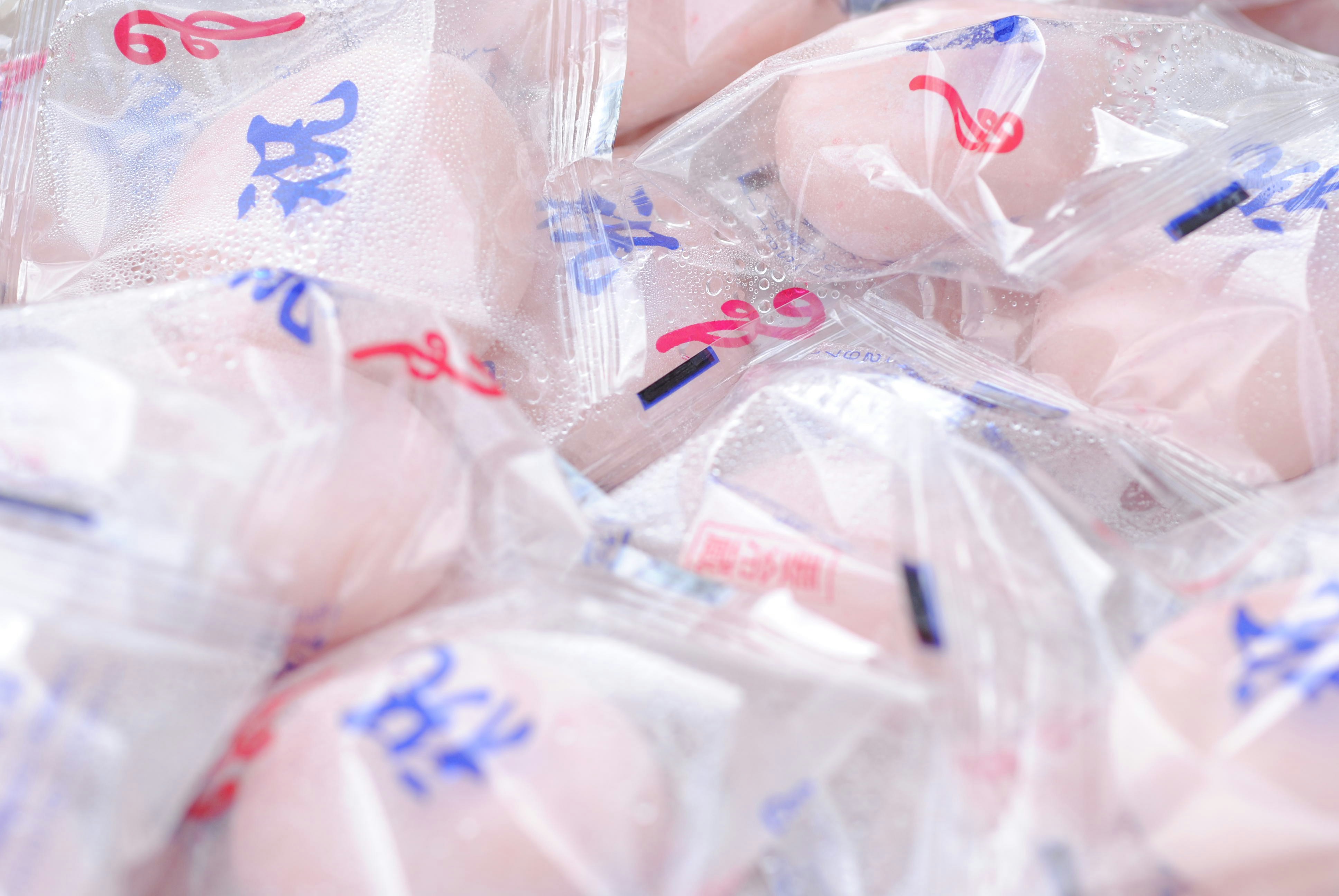 Pastel Eggs in Clear Wrappings: A Quiet Stack of Freshness