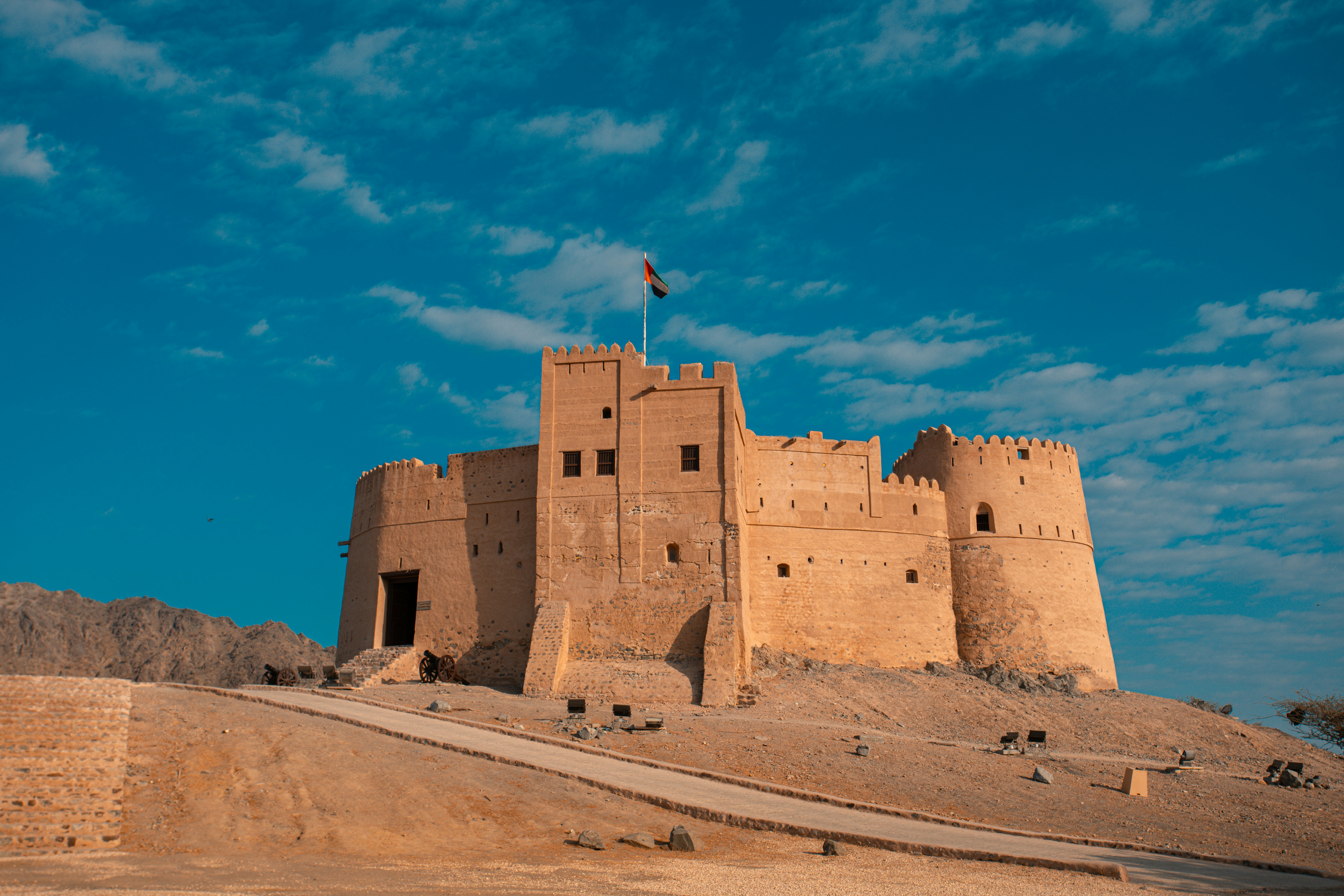 A historic fort stands strong under a blue sky. photo – Free Building ...