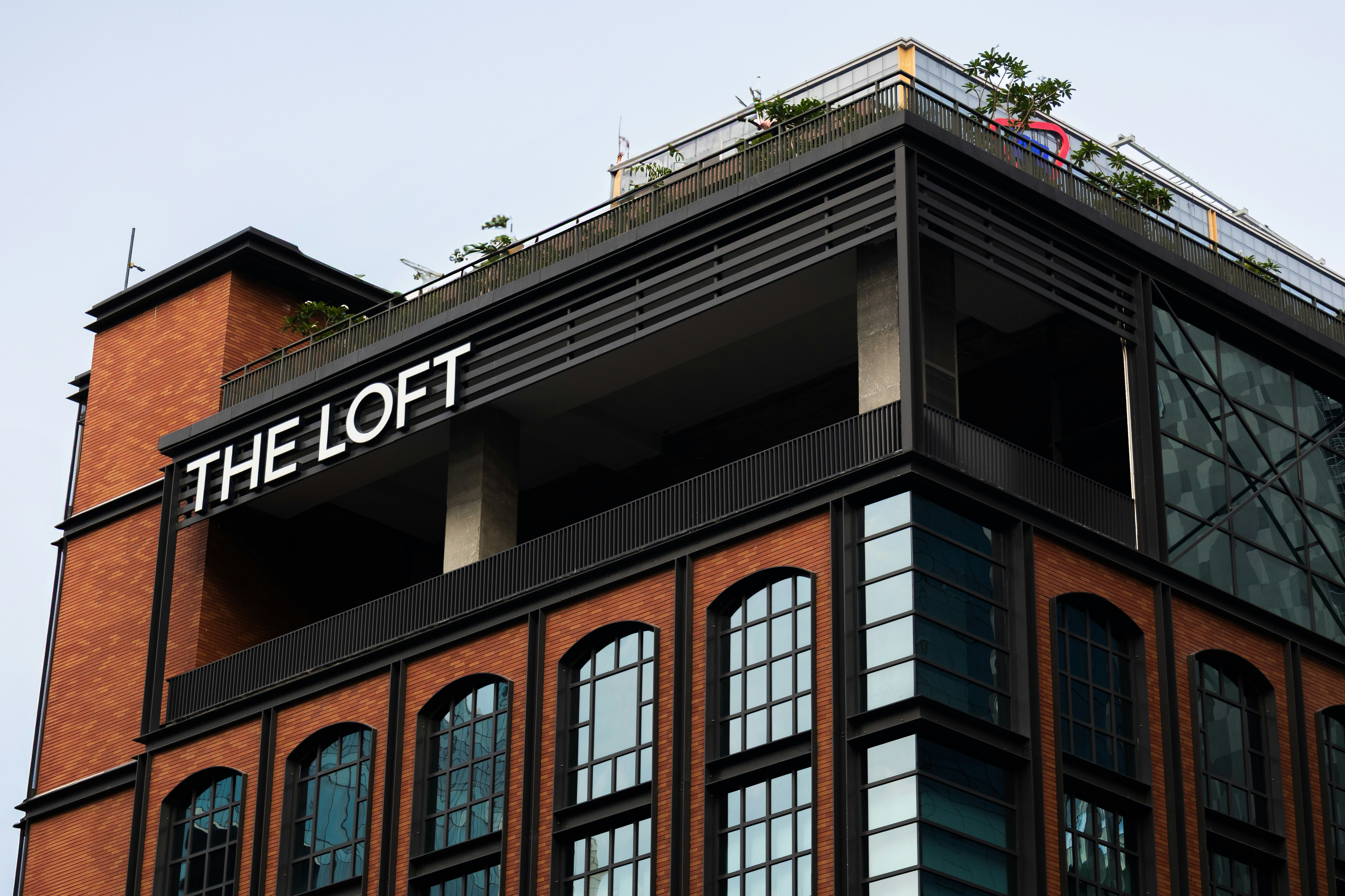 The loft building has a red brick facade. photo – Free Building Image ...