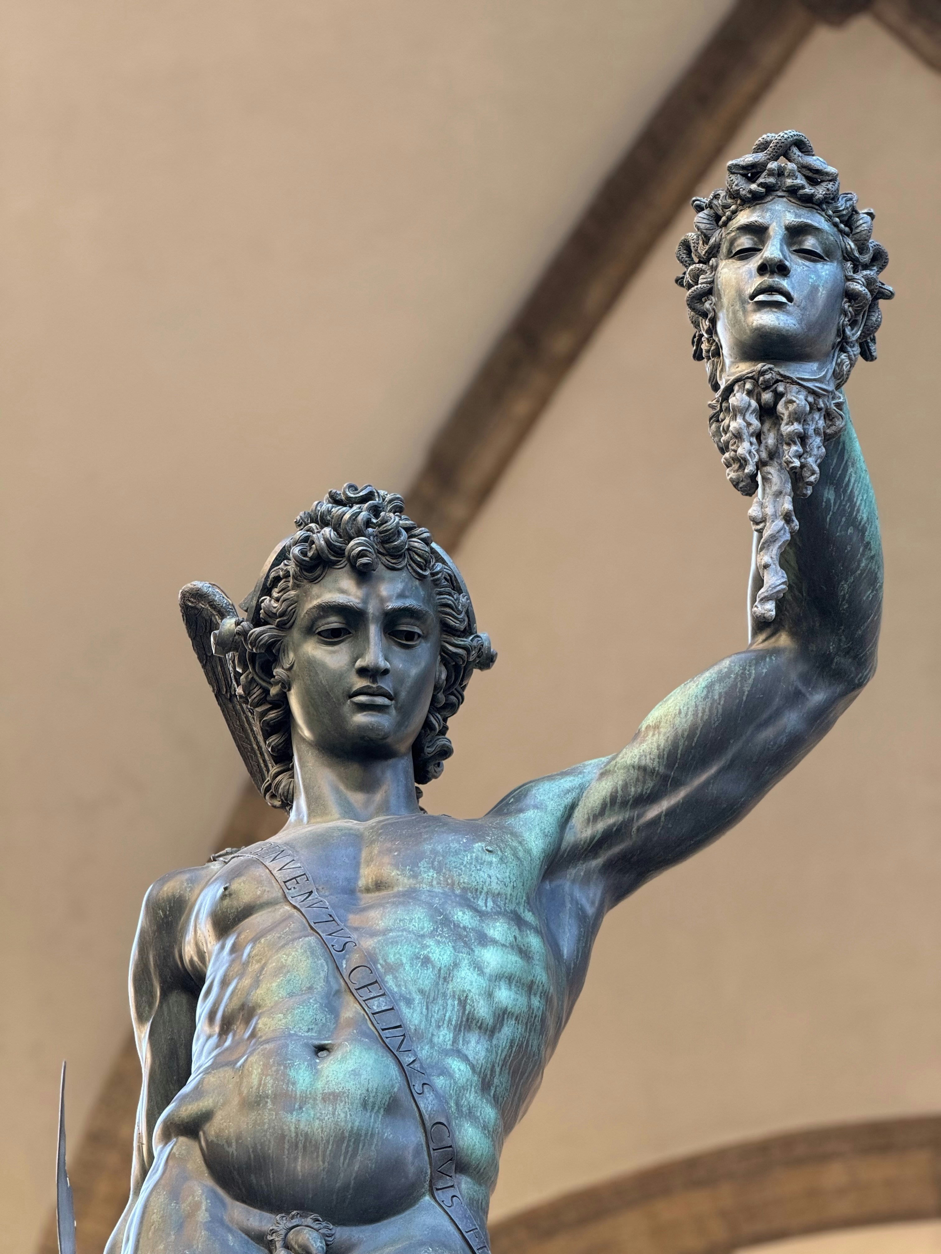 A statue of perseus holding medusa's head. photo – Free Art Image on ...