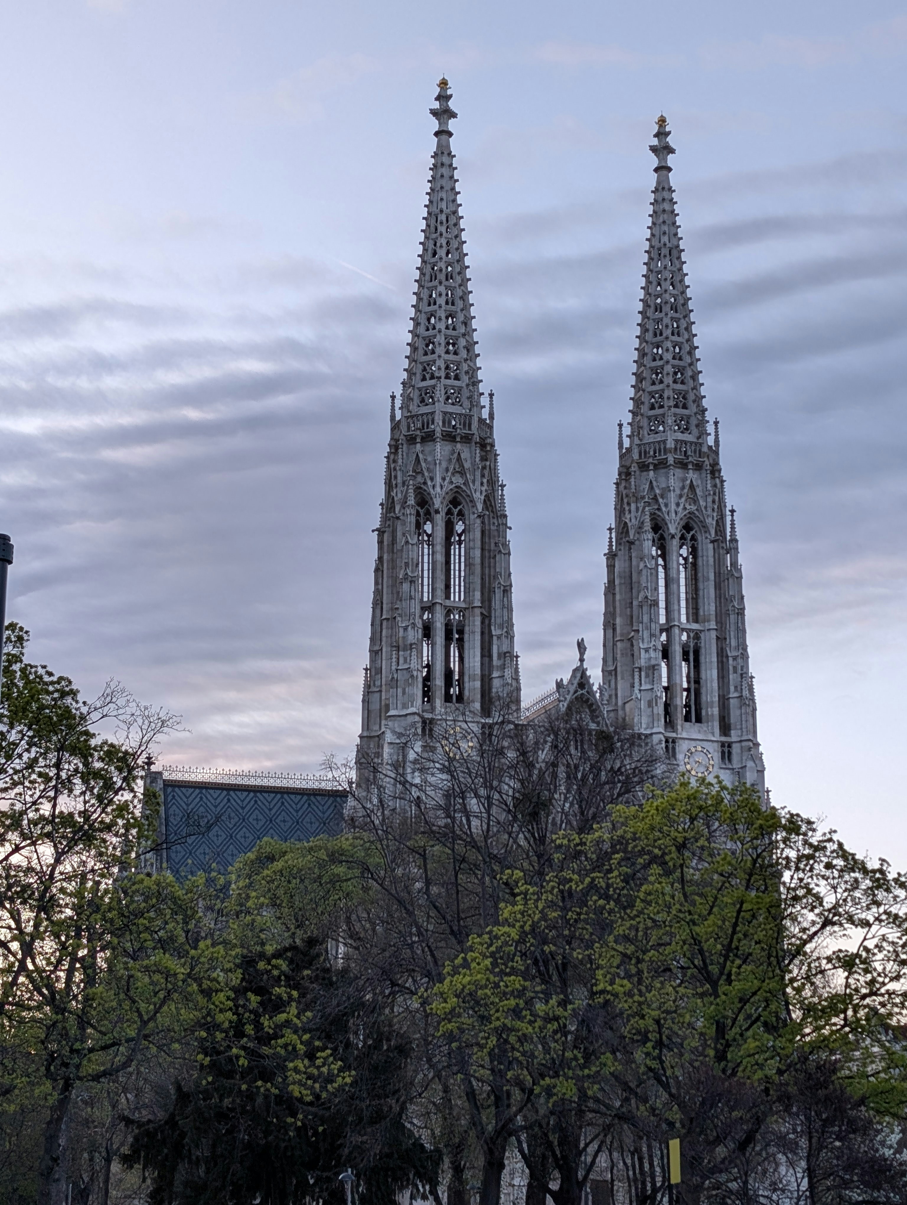 Twin spires of a large cathedral tower overhead. photo – Free Wallpaper ...