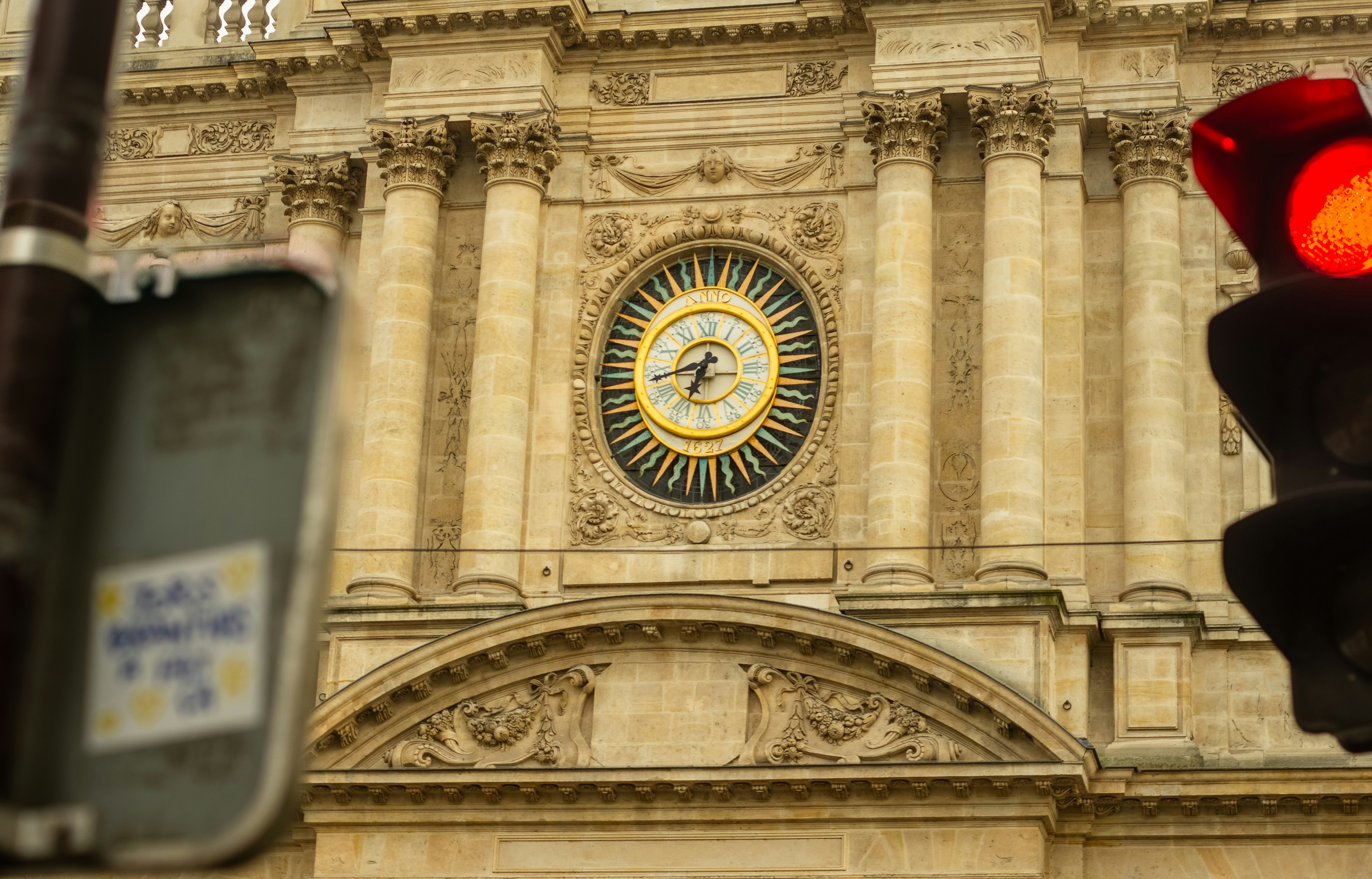 Urban Timepiece Amidst Traffic