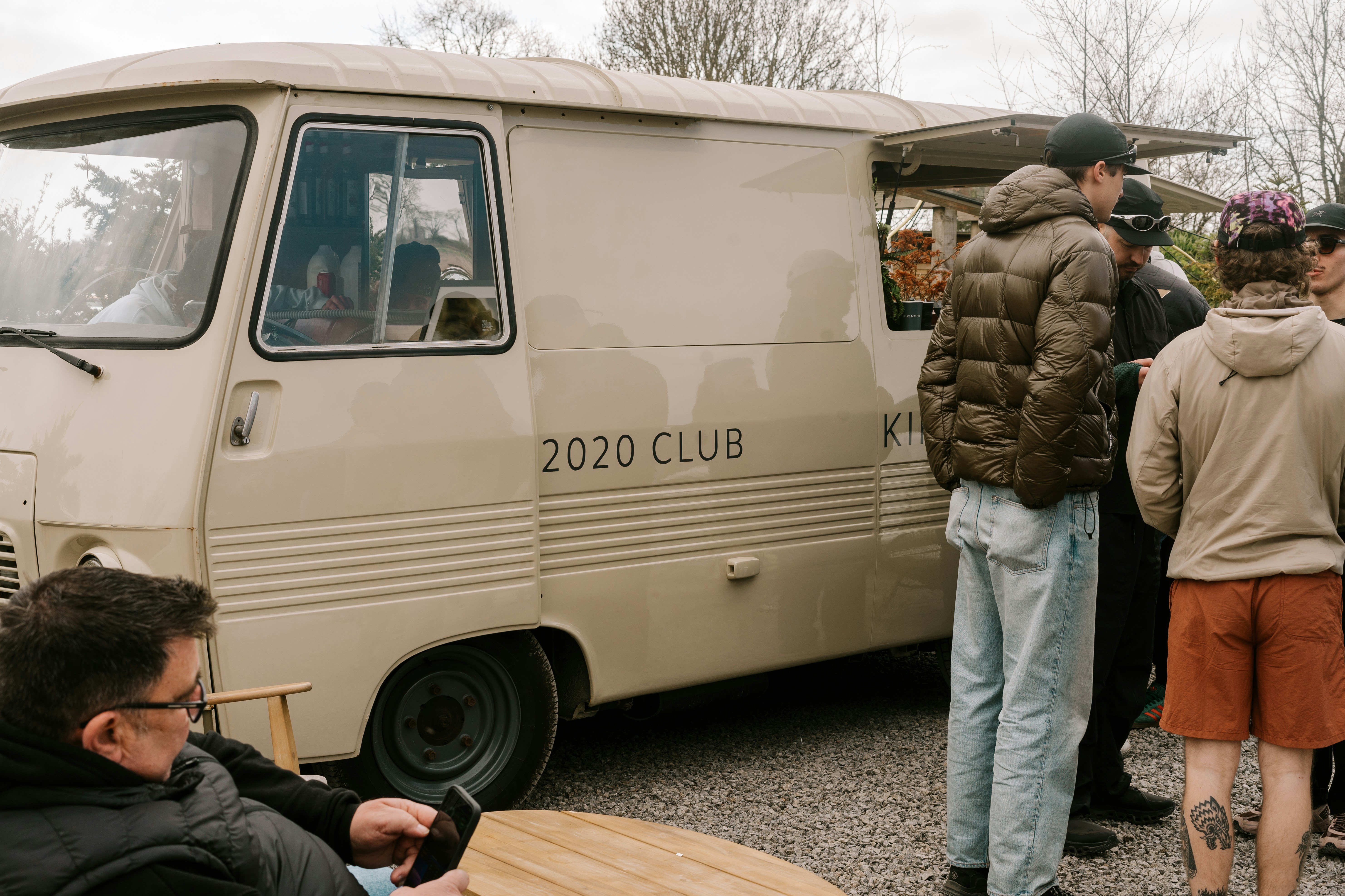 People gather near a vintage van with a food stall. photo – Free Car ...