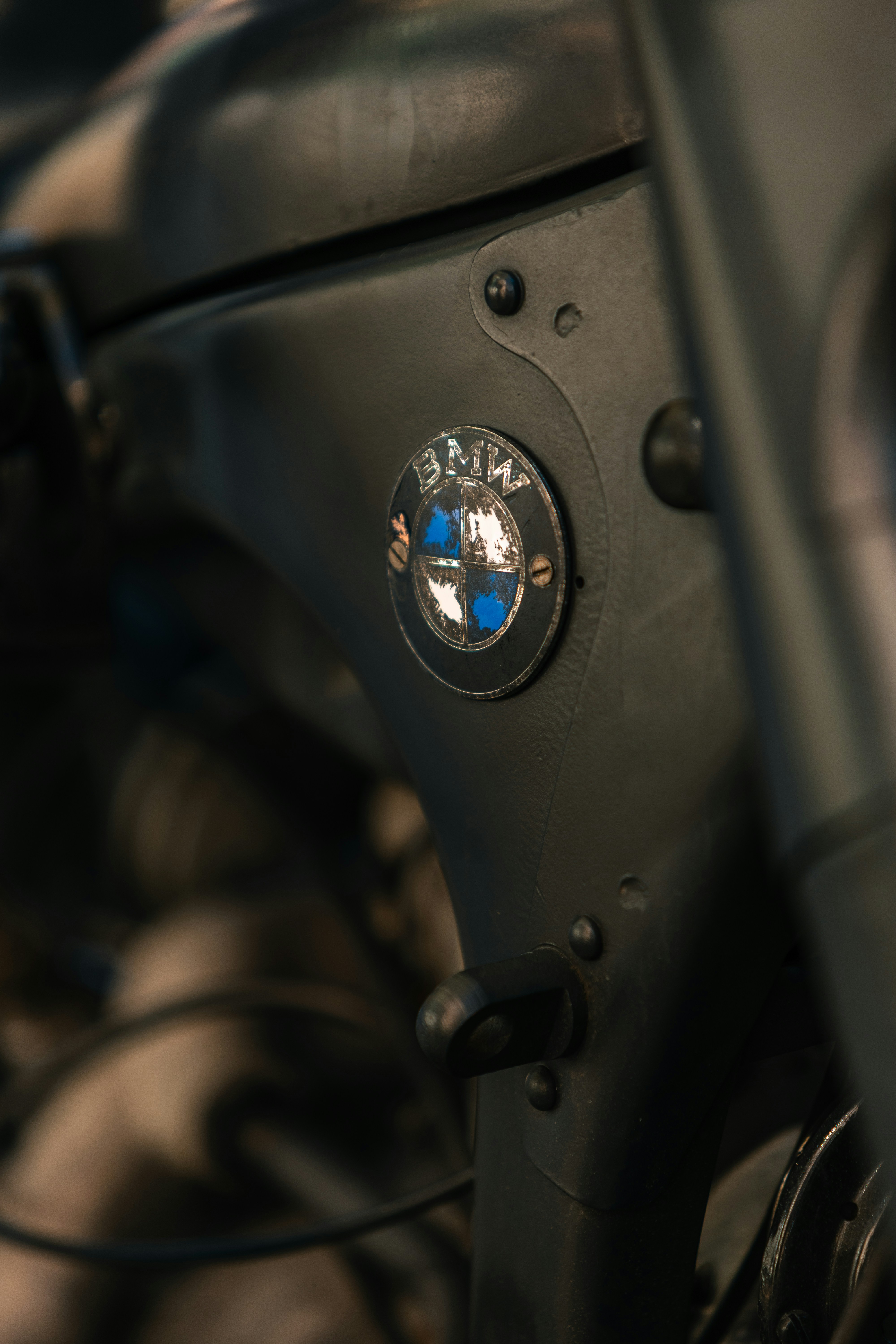 Emblem in Focus: a close look at the BMW badge on the motorcycle frame