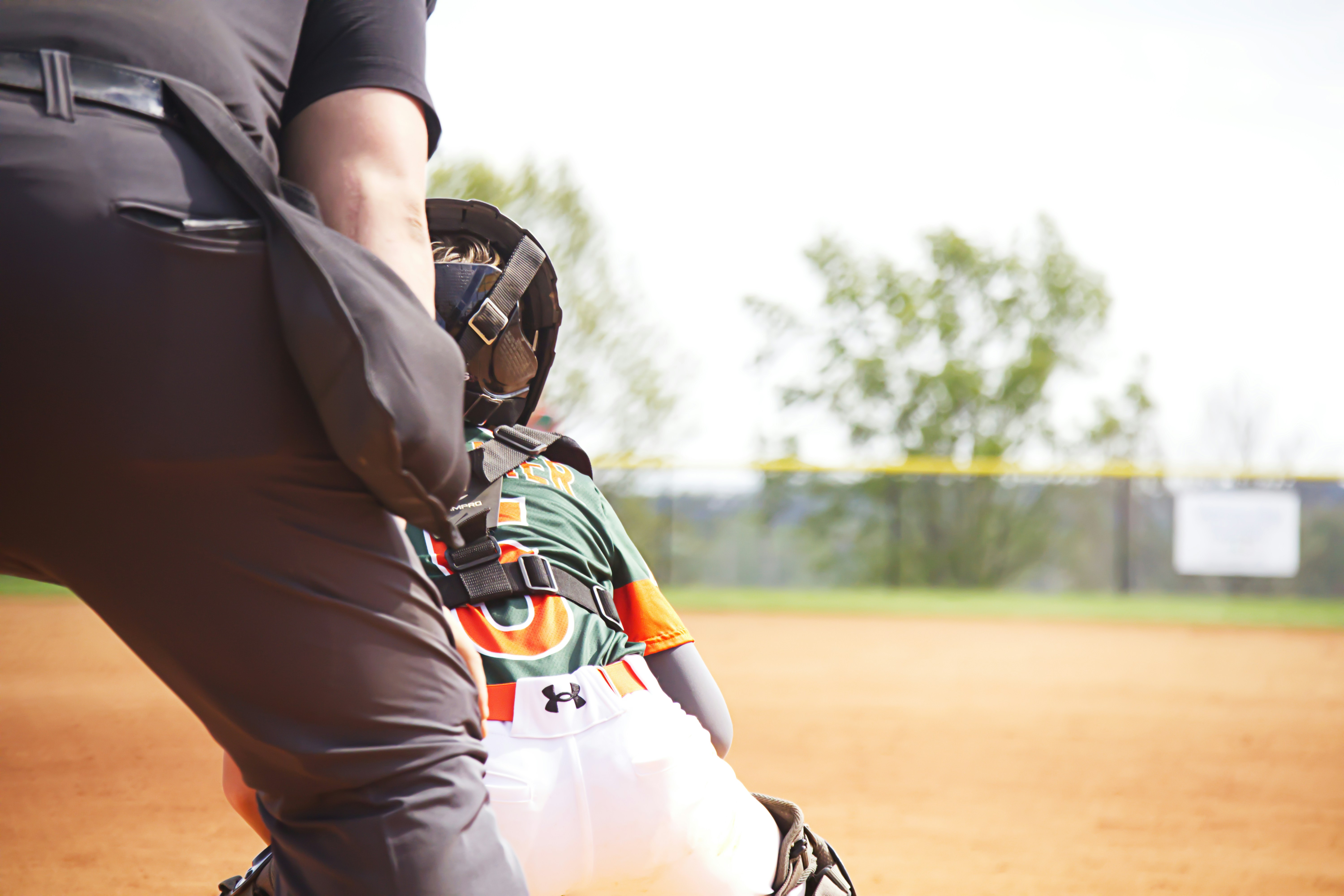 A baseball catcher is ready for the pitch. photo – Free Man Image on ...