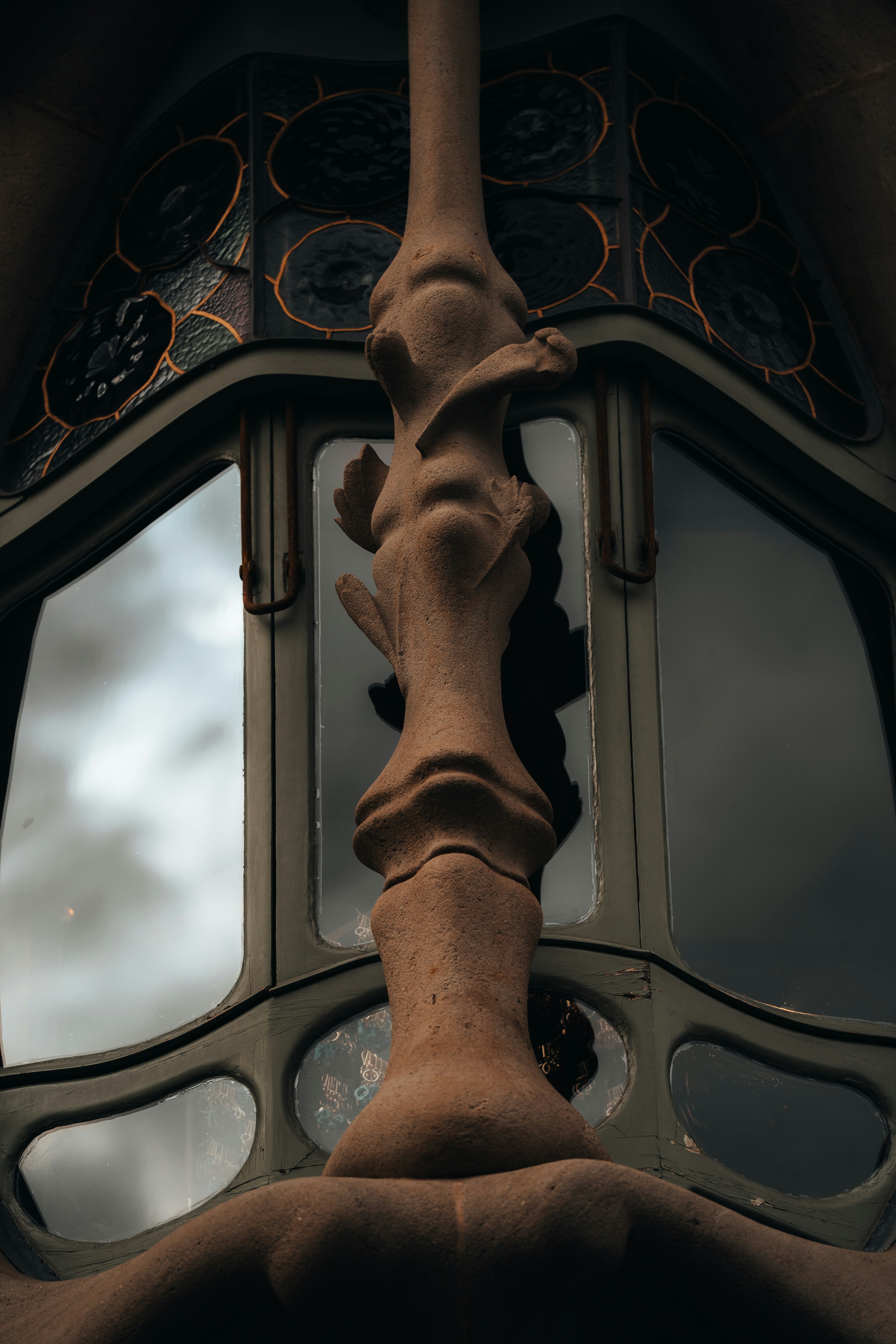 Rust-Colored Spine Framing a Victorian Glass Door