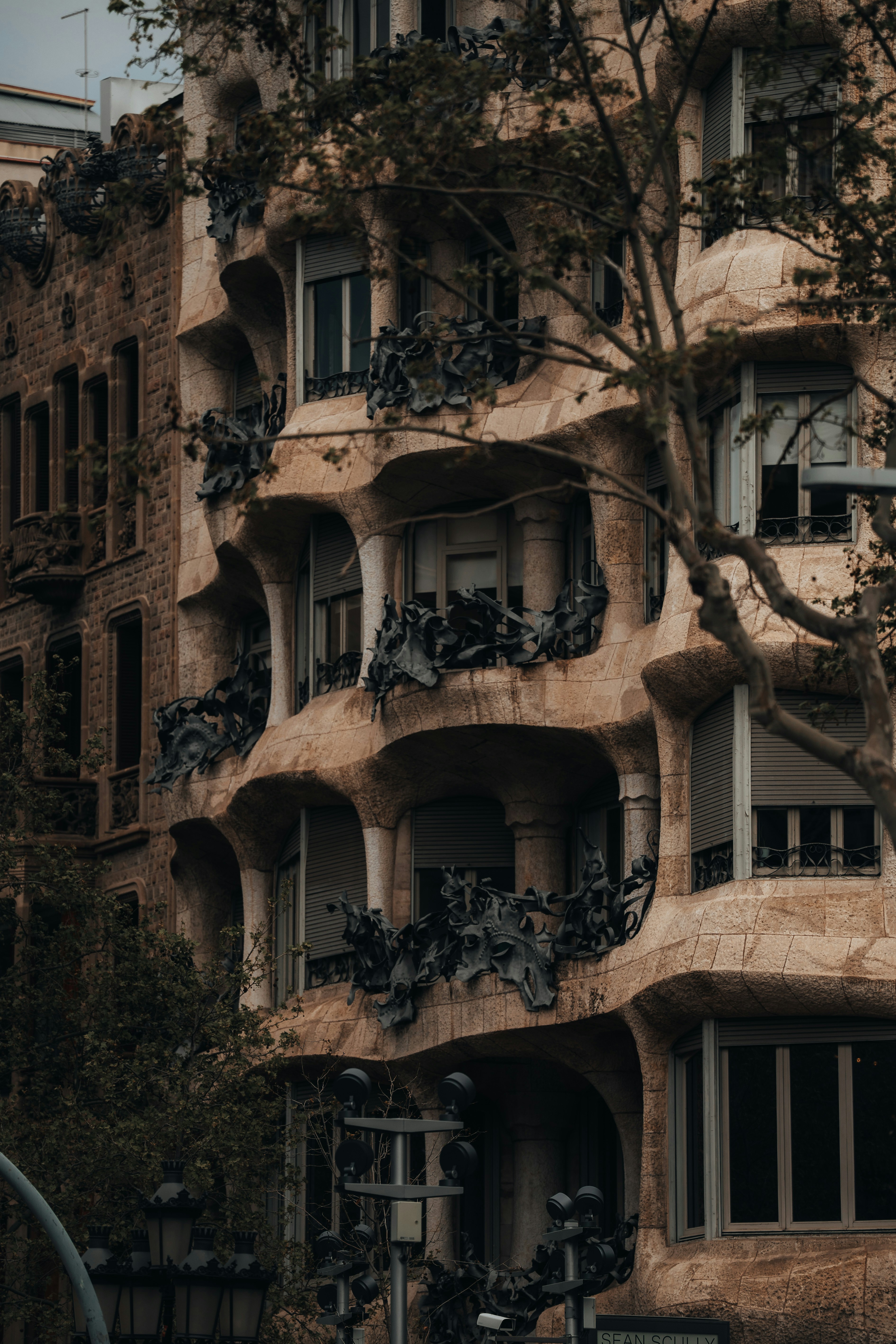 An architectural building showcases unique curves and details. photo ...