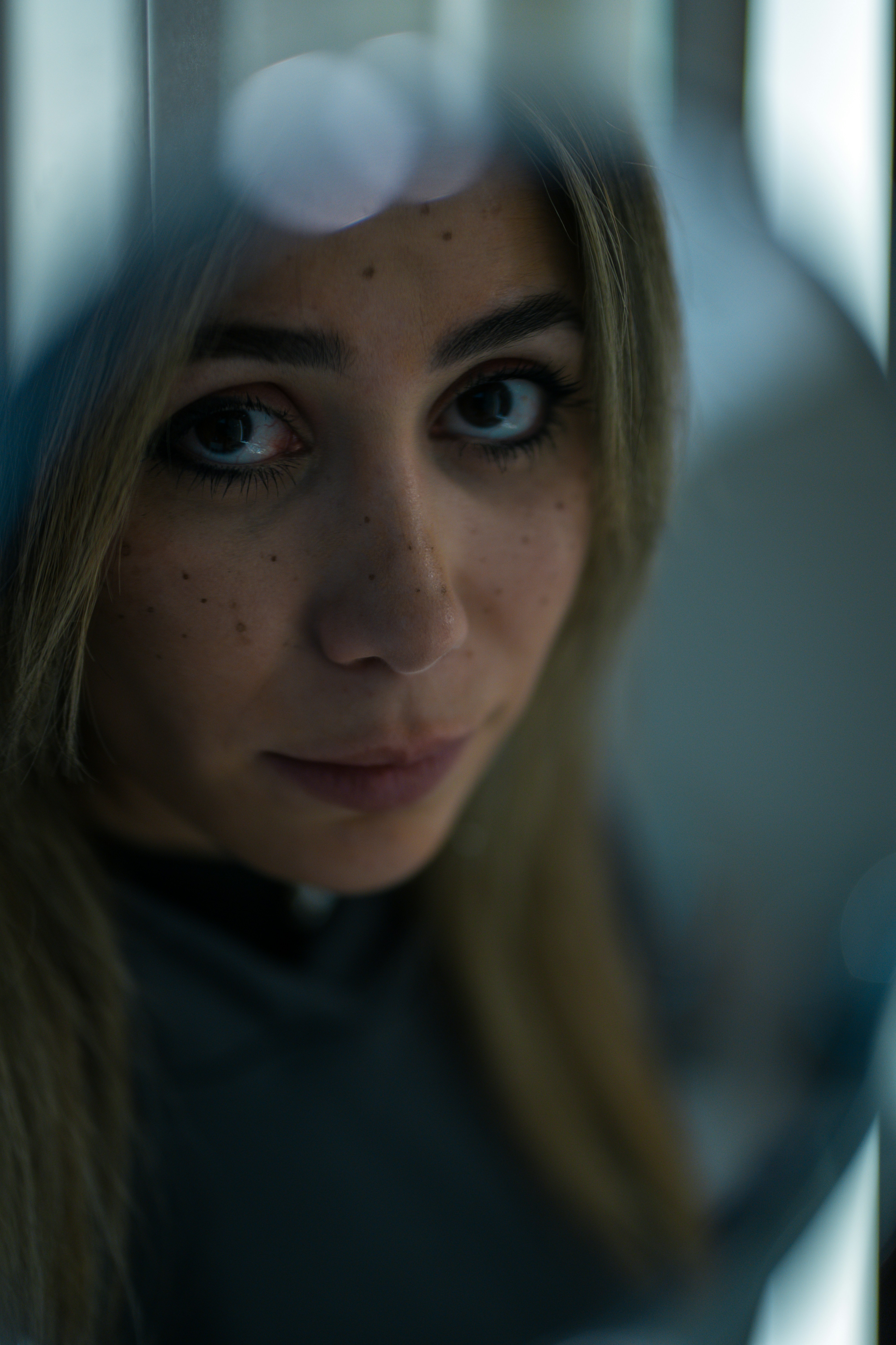 A woman stares intensely into the camera. photo – Free Portrait Image ...